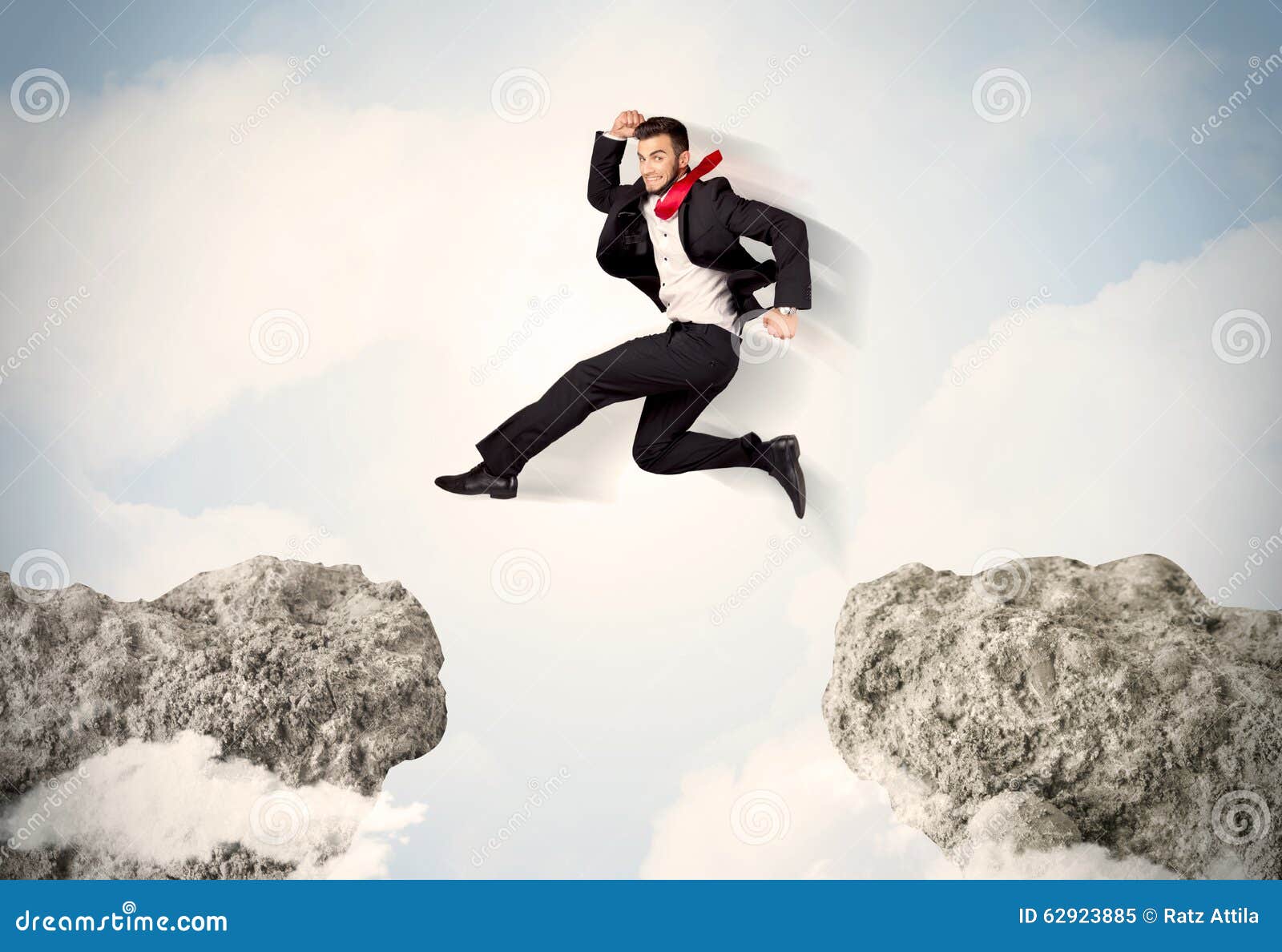Happy Business Man Jumping Over a Cliff Stock Image - Image of ...
