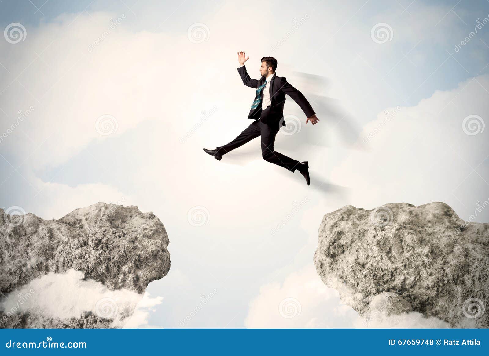 Happy Business Man Jumping Over a Cliff Stock Photo - Image of ...