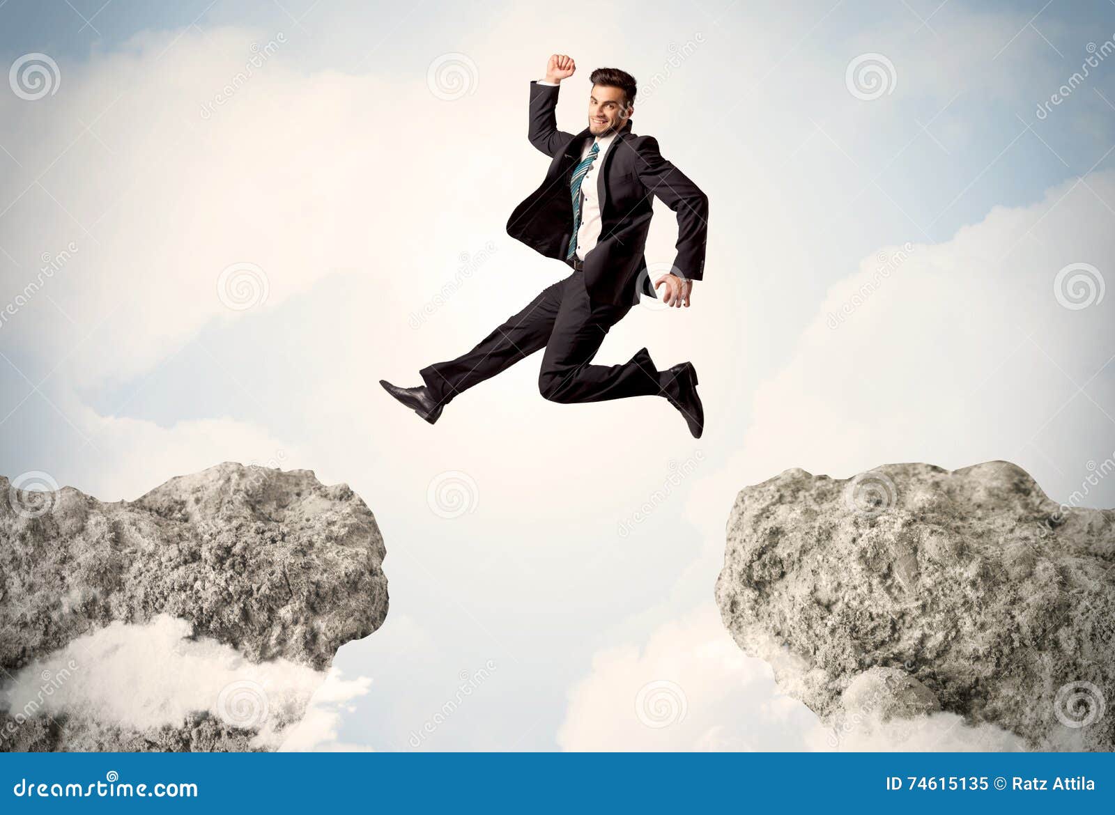Happy Business Man Jumping Over a Cliff Stock Image - Image of ...
