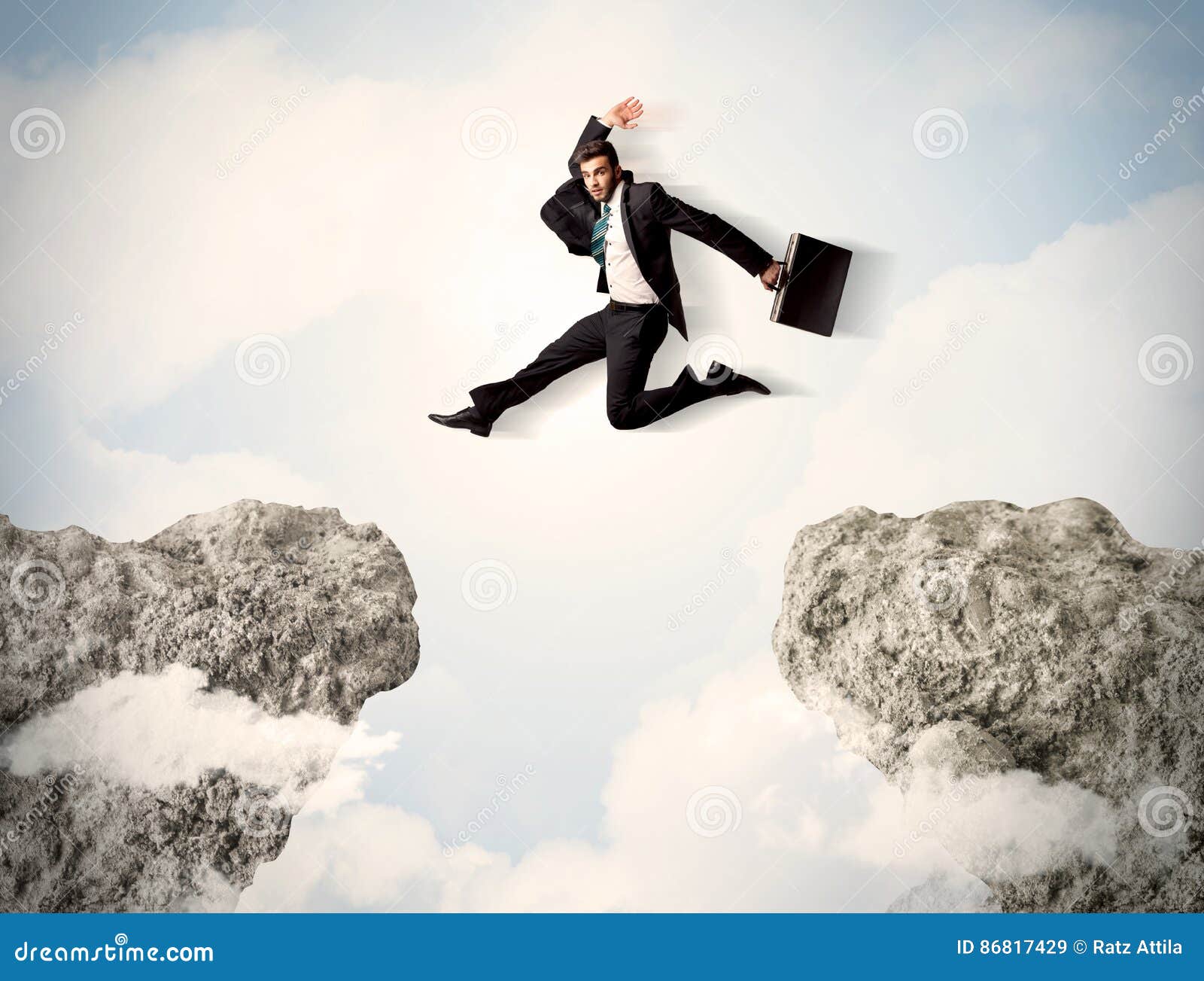 Happy Business Man Jumping Over a Cliff Stock Image - Image of ...