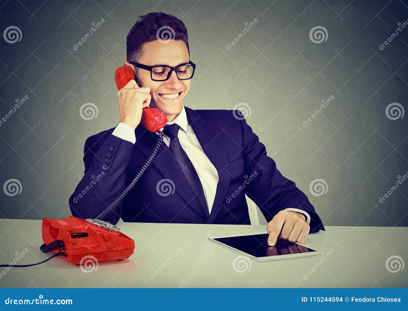 Happy Business Man Using Tablet Computer Having Conversation on the ...