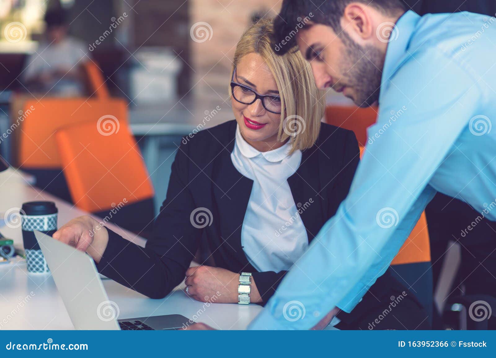 Happy Business Partners Working on Laptop. Teamwork, Co-working ...