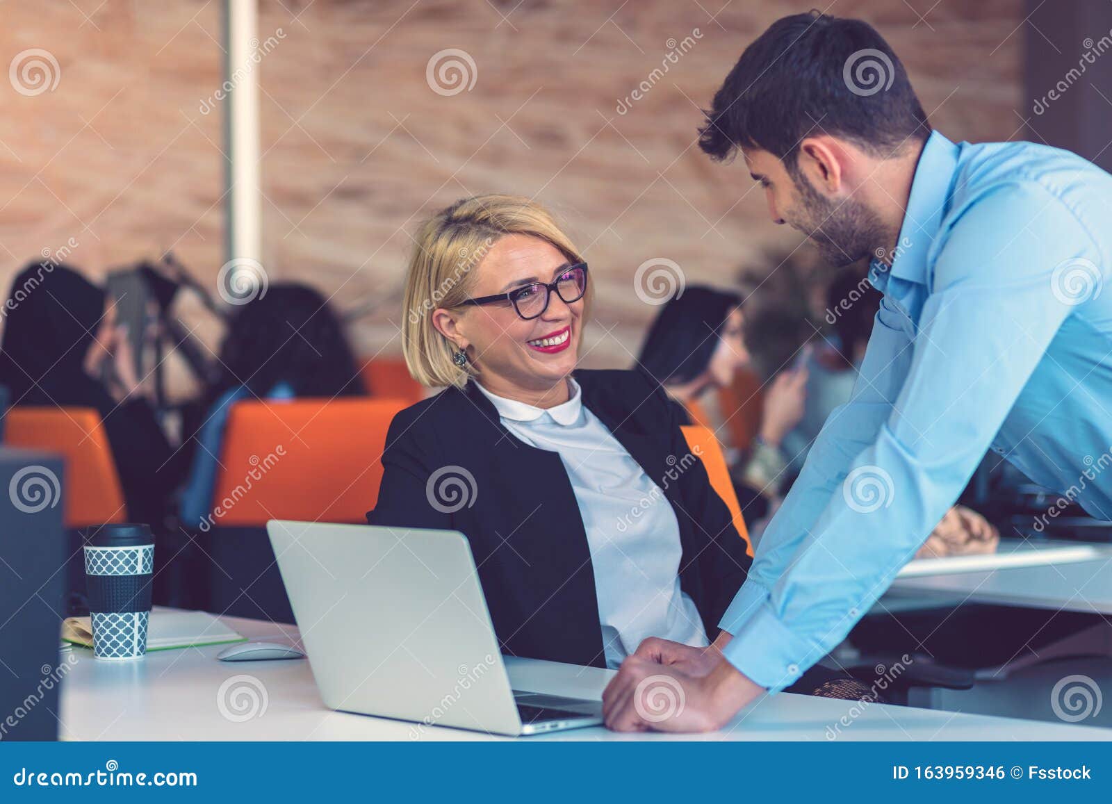 Happy Business Partners Working on Laptop. Teamwork, Co-working ...
