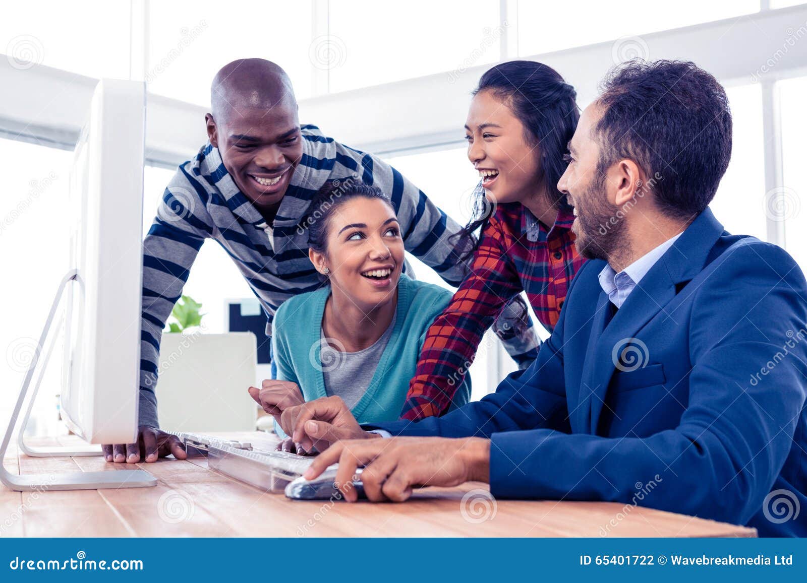 Happy Business People Discussing at Creative Office Stock Photo - Image ...