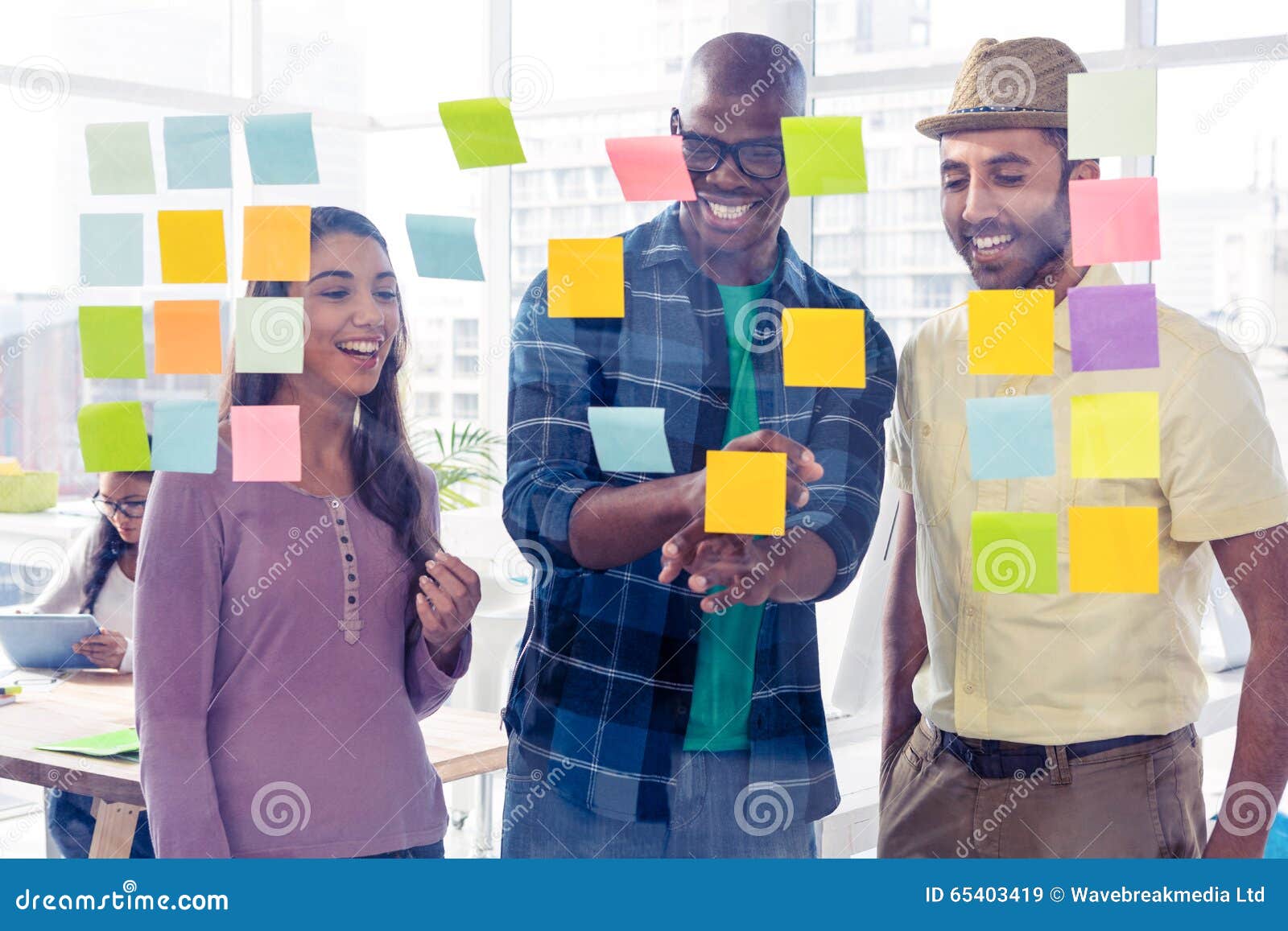 Happy Business People Discussing Over Adhesive Notes Stock Image ...