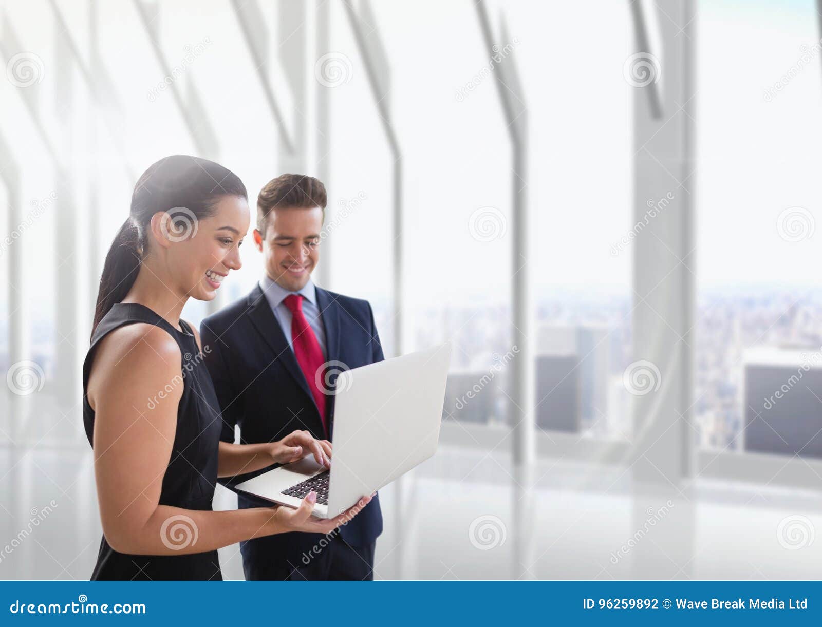 Happy Business People Looking at a Computer Stock Photo - Image of ...