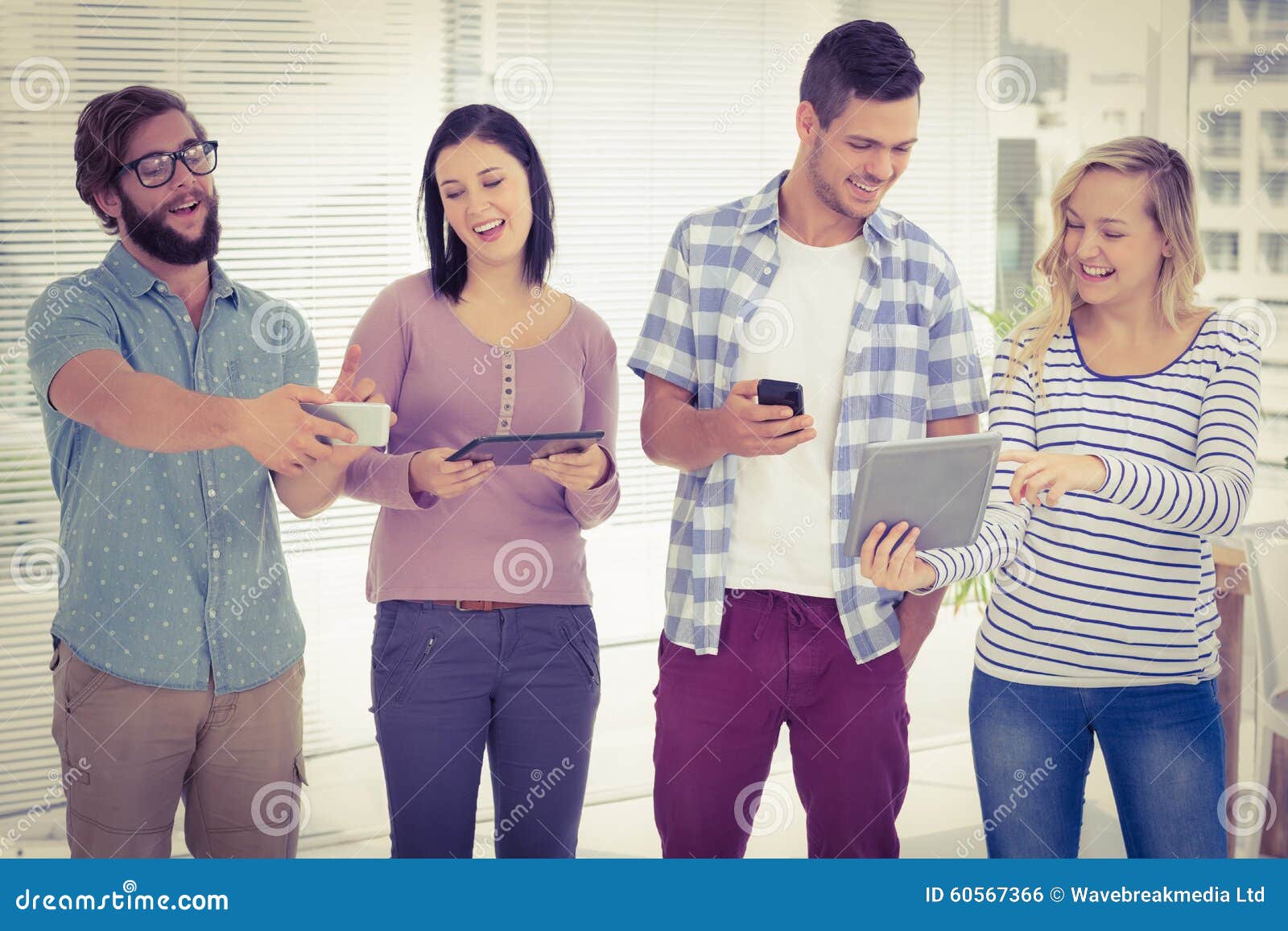 Happy Business People Using Electronic Gadgets Stock Photo - Image of ...