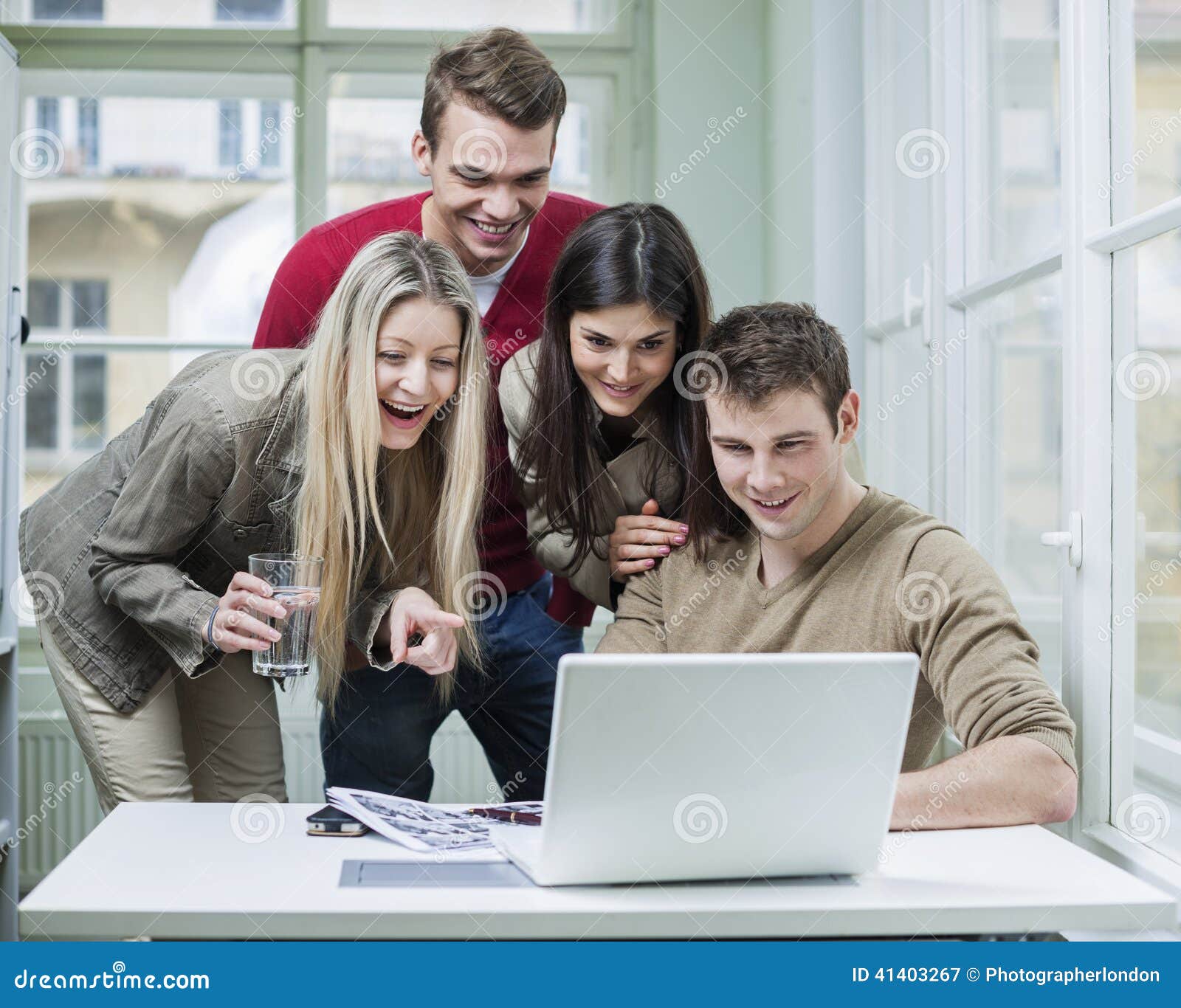 Happy Business People Using Laptop in Meeting Stock Image - Image of ...