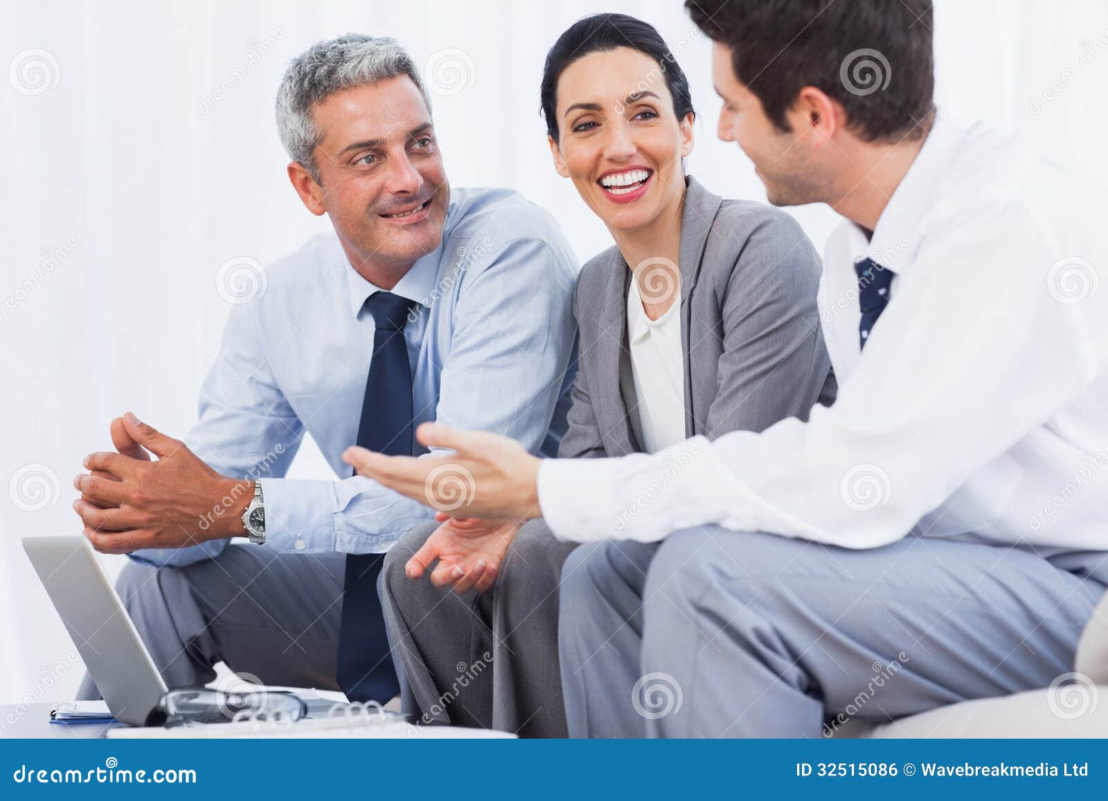 Happy Business People Working with Their Laptop on Sofa Stock Photo ...