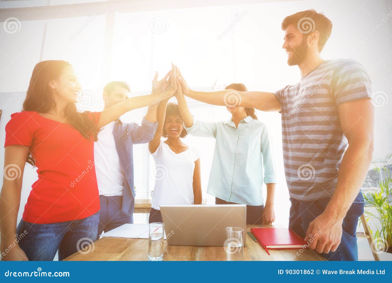 Happy Business Team Putting Their Hands Together Stock Photo - Image of ...