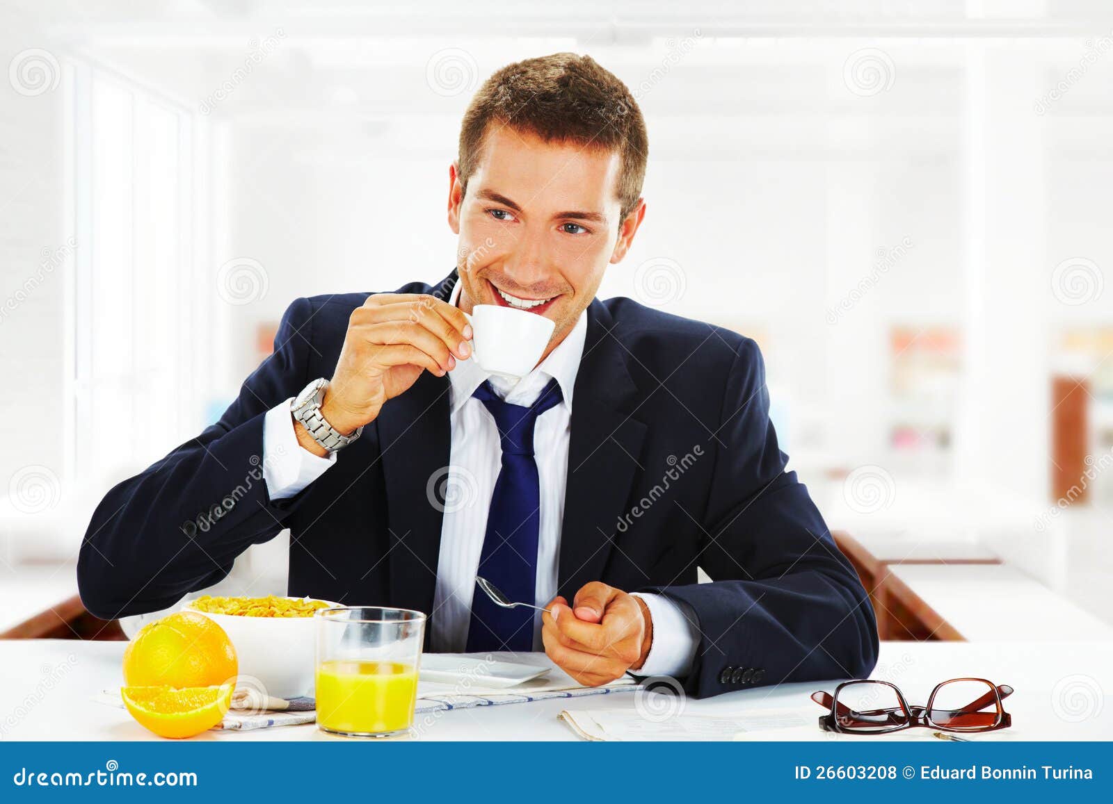 Happy Businessman Having Breakfast at Office Stock Photo - Image of ...