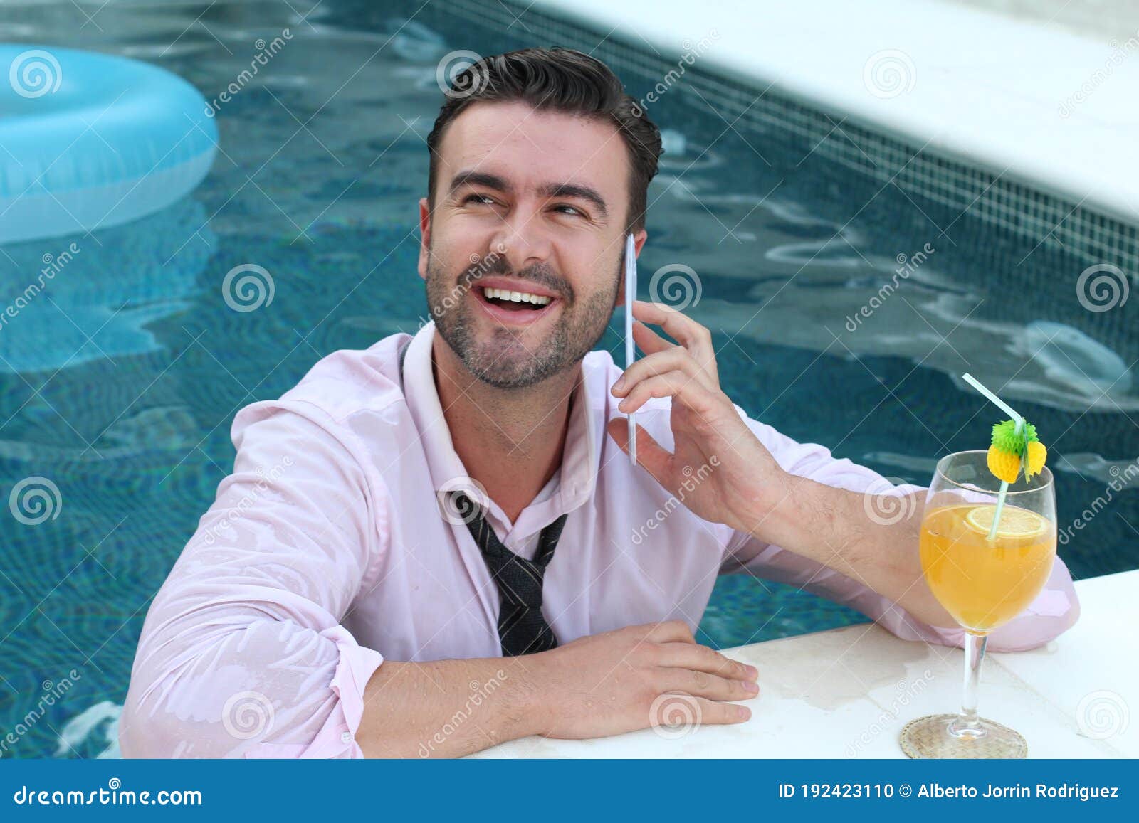 Happy Businessman Making a Call in Swimming Pool Stock Photo - Image of ...