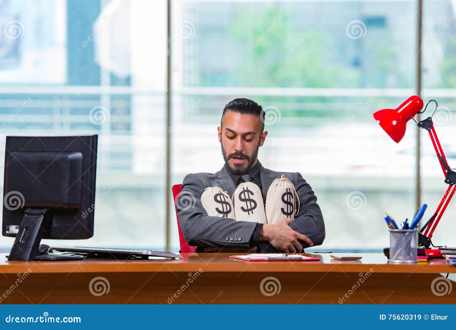 The Happy Businessman with Money Sacks in the Office Stock Image ...
