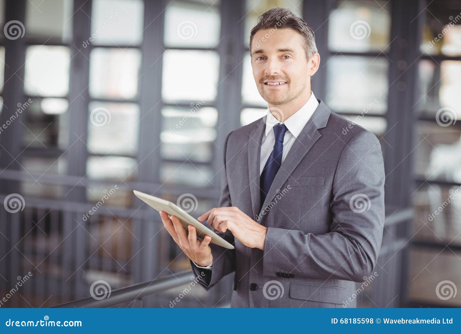 Happy Businessman Using Digital Tablet Stock Photo - Image of ... Happy Businessman Using Digital Tablet Stock Photo - Image of ...