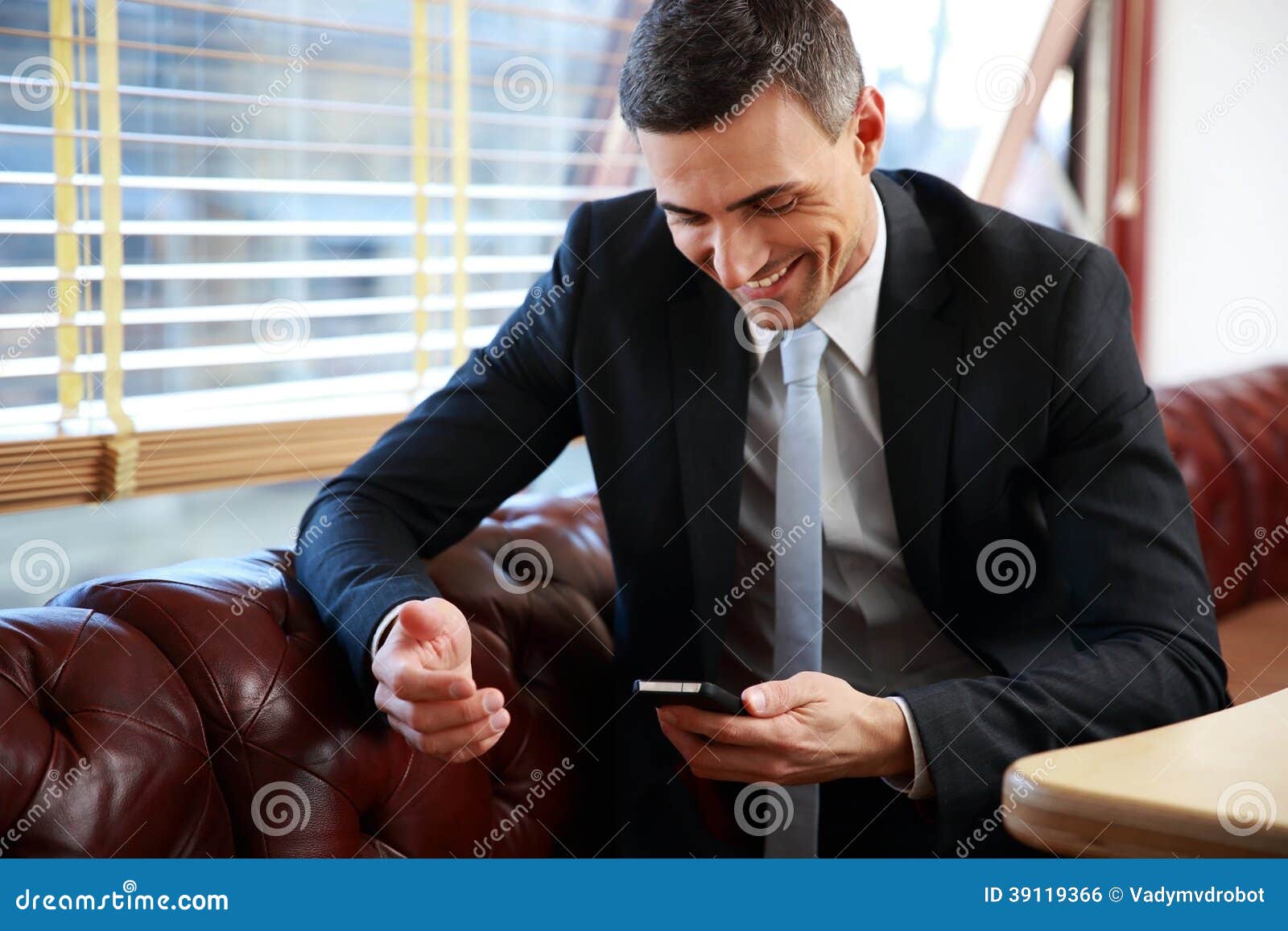 Happy Businessman Using Smartphone Stock Photo - Image of digital ...