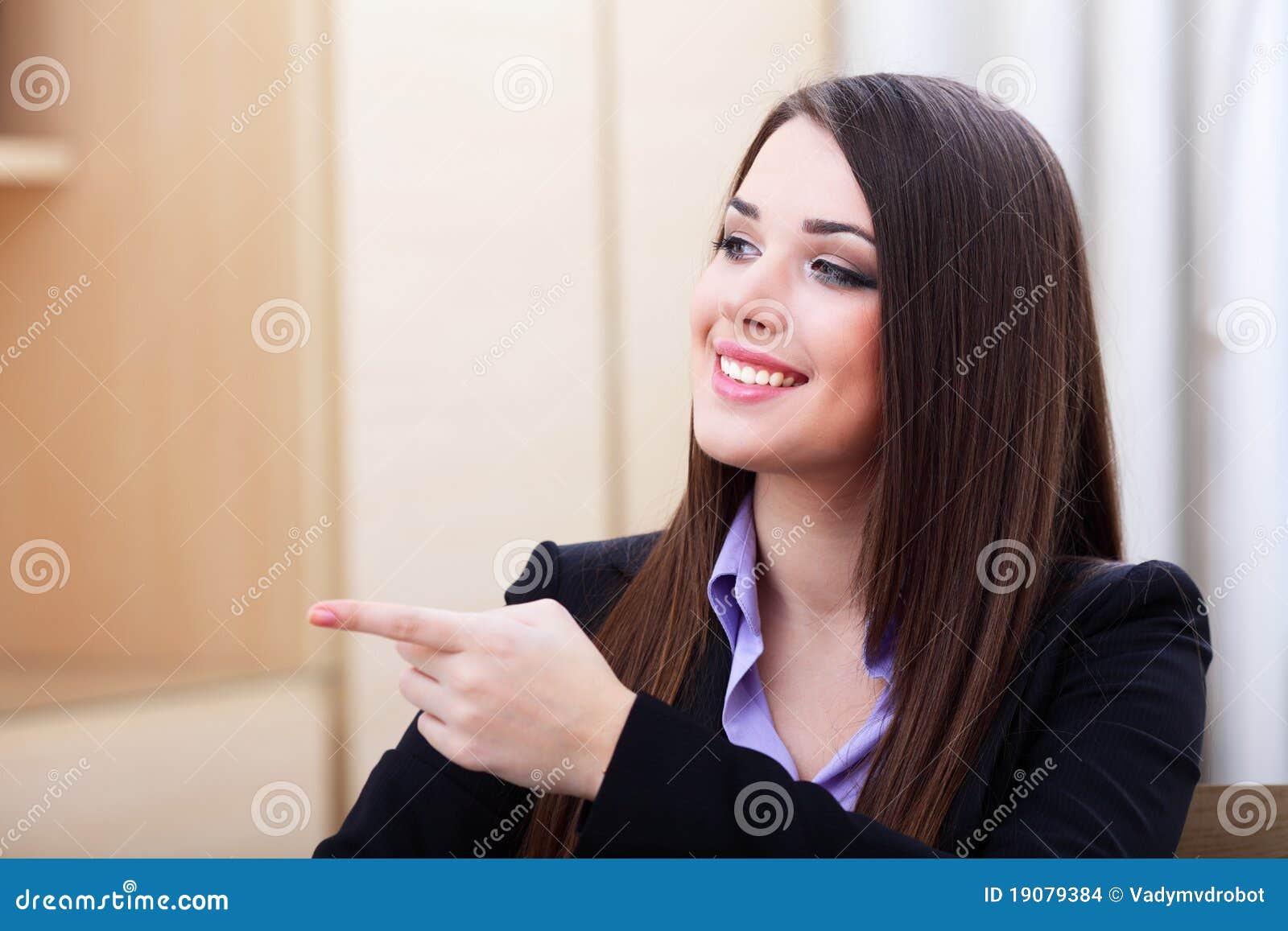 Happy Businesswoman in Office Pointing Aside Stock Photo - Image of ...