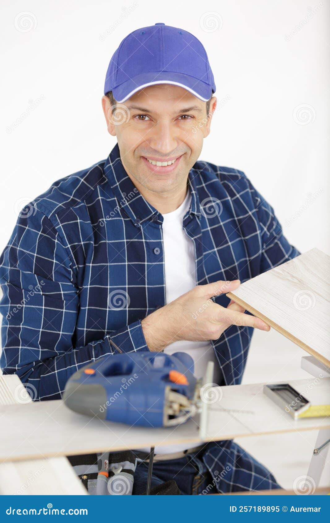 Happy carpenter at work stock image. Image of push, builder - 257189895