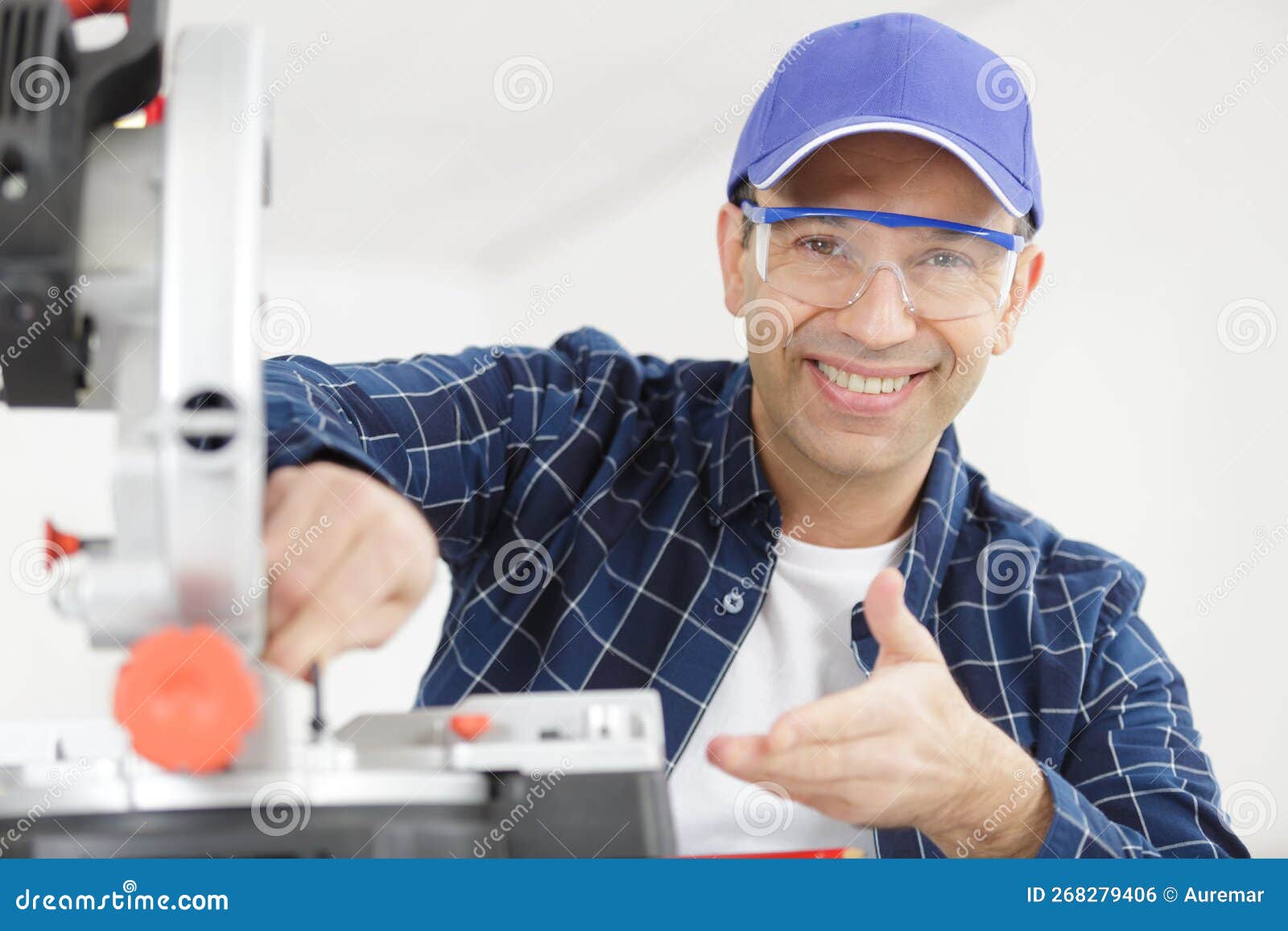 Happy Carpenter Working on Electric Buzz Saw Stock Photo - Image of ...