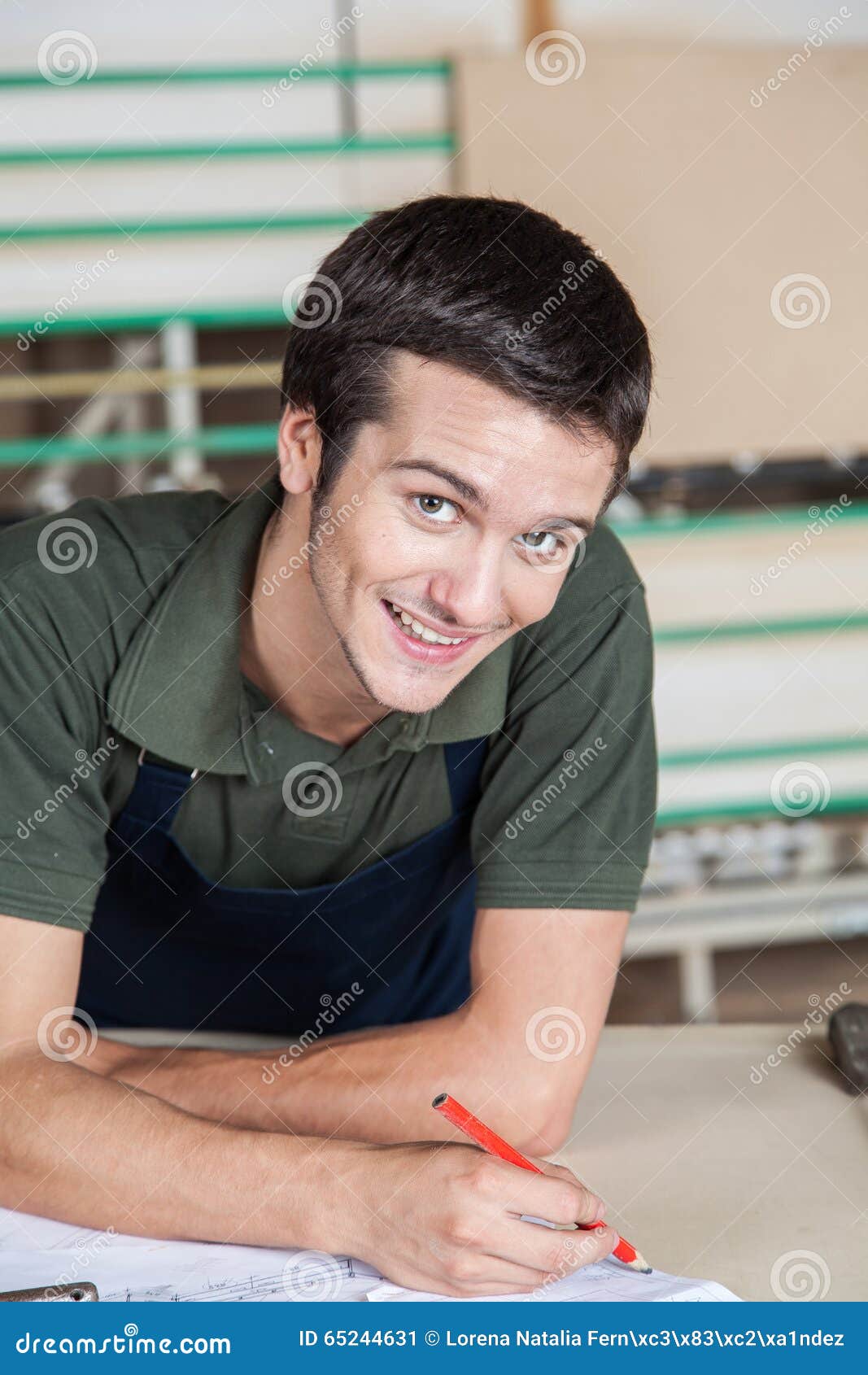 Happy carpenter writing stock image. Image of releases - 65244631