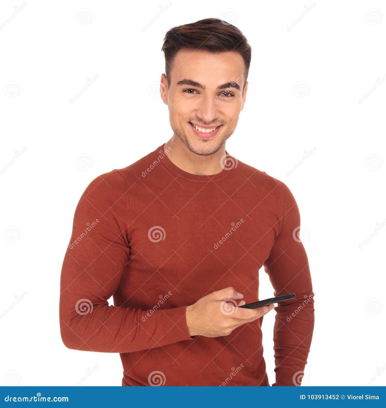 Happy Casual Young Man Texting on His Phone Stock Photo - Image of ... Happy Casual Young Man Texting on His Phone Stock Photo - Image of ...