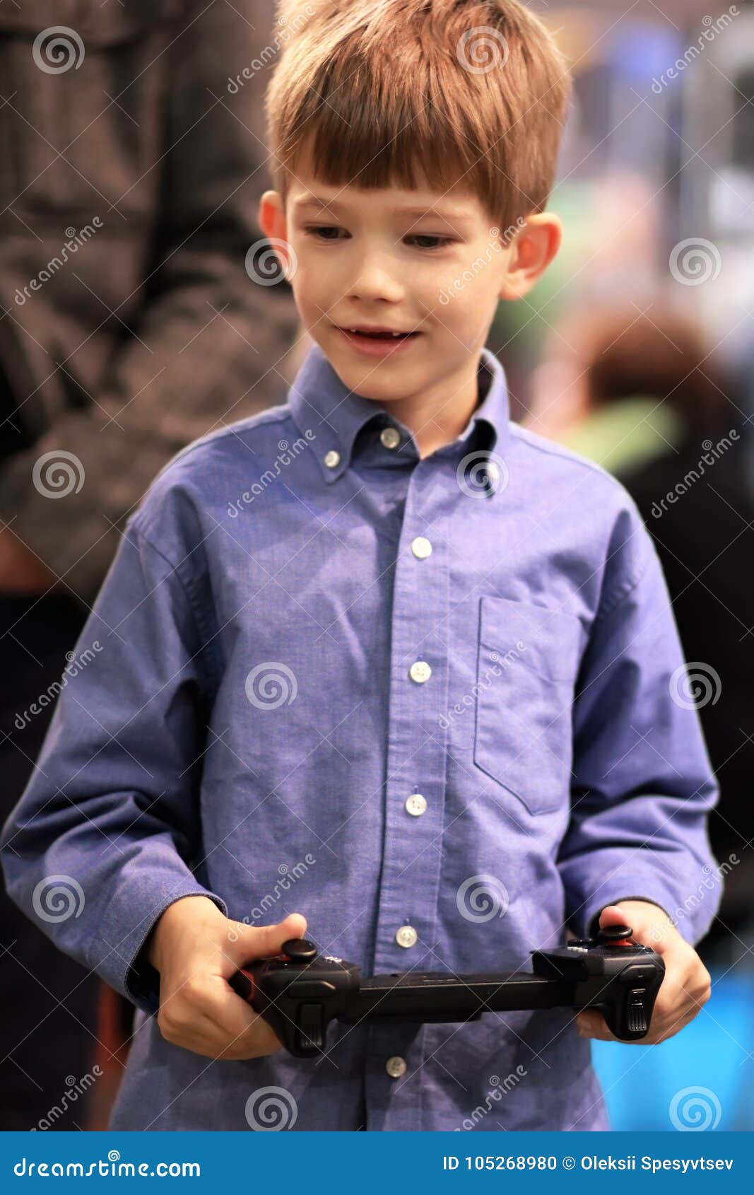 Happy Caucasian Boy Playing with Remote Control Stock Photo - Image of ...