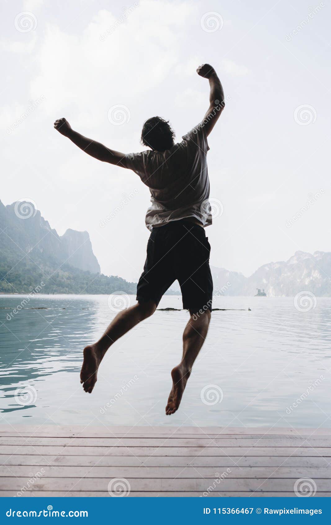 Happy Caucasian Man Jumping with Joy Stock Image - Image of foggy ...
