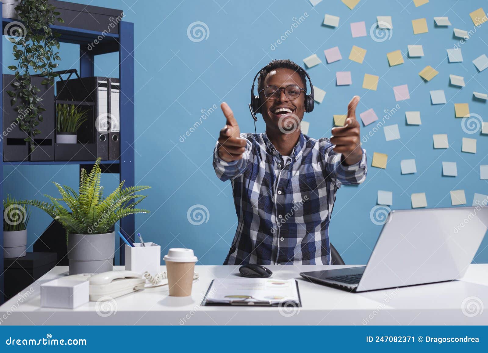 Happy Cheerful Customer Support Representative Indicating that Client ...