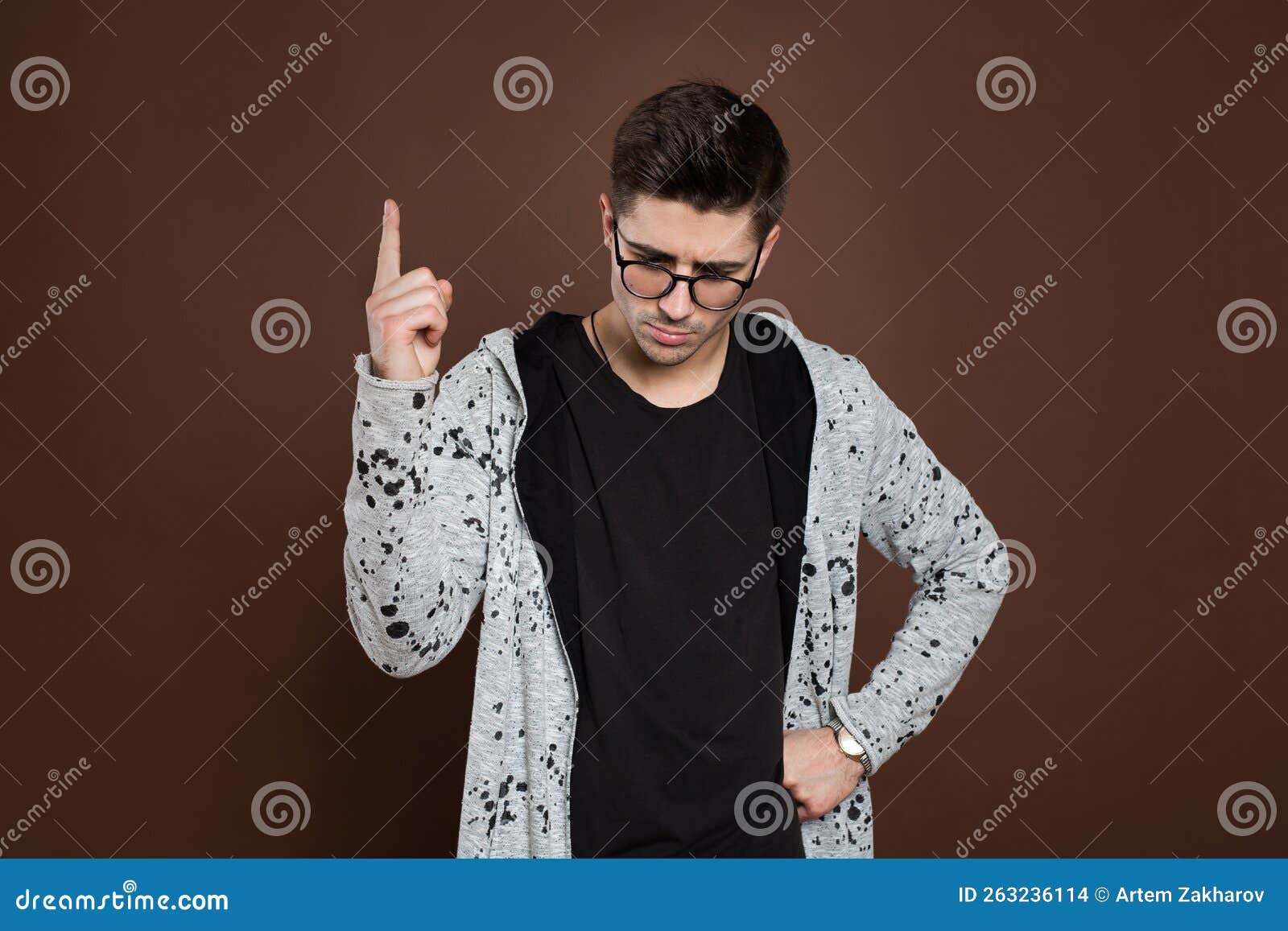 Happy Cheerful Young Guy Gesturing Up with Fingers. Stock Photo - Image ...