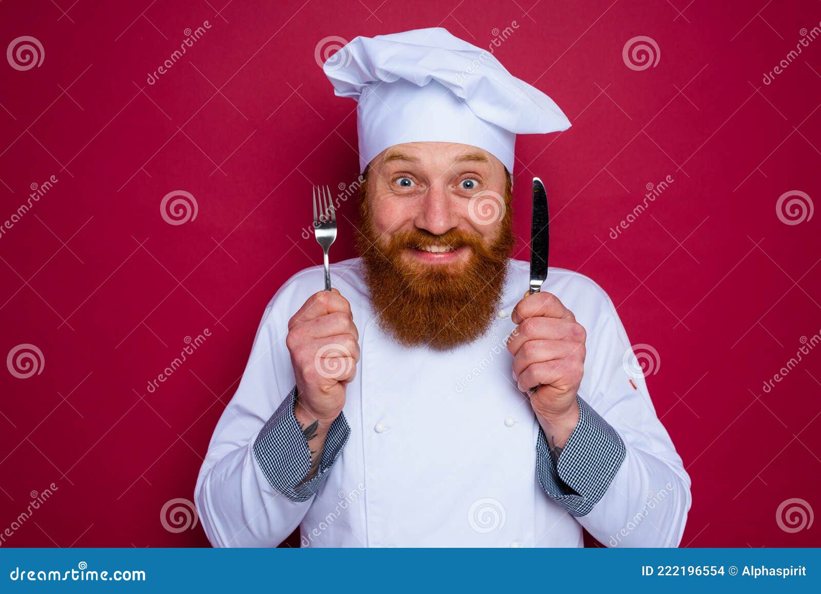 Happy Chef with Beard and Red Apron Holds Cutlery in Hand Stock Photo ...