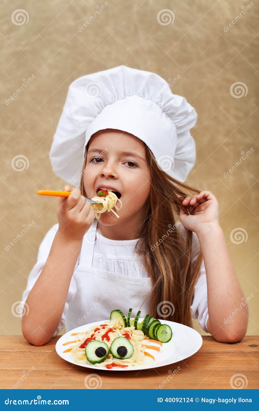 Happy Chef Child Eating a Creative Pasta Dish Stock Photo - Image of ...