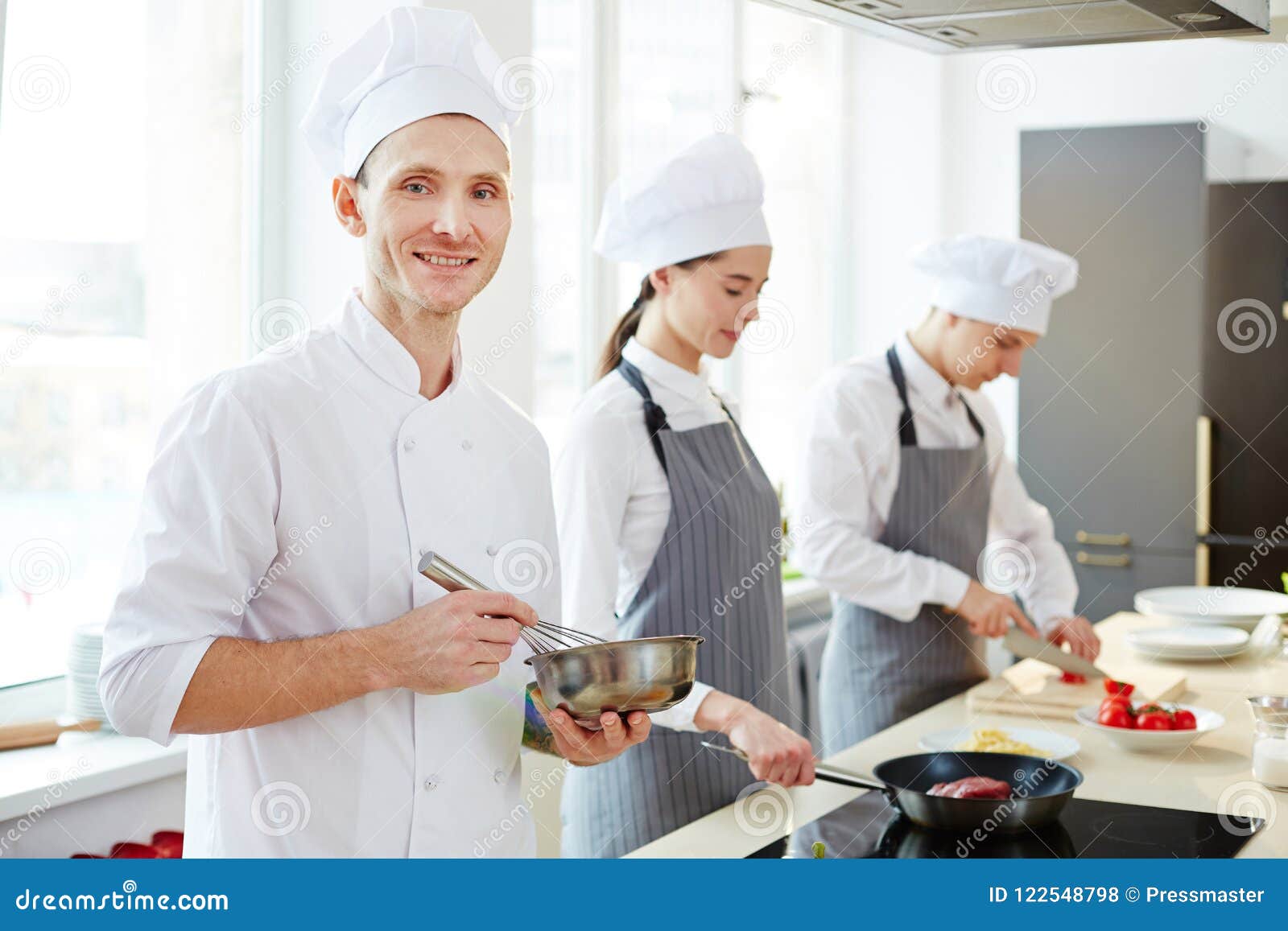 Happy chef using whisk stock photo. Image of bowl, adult - 122548798