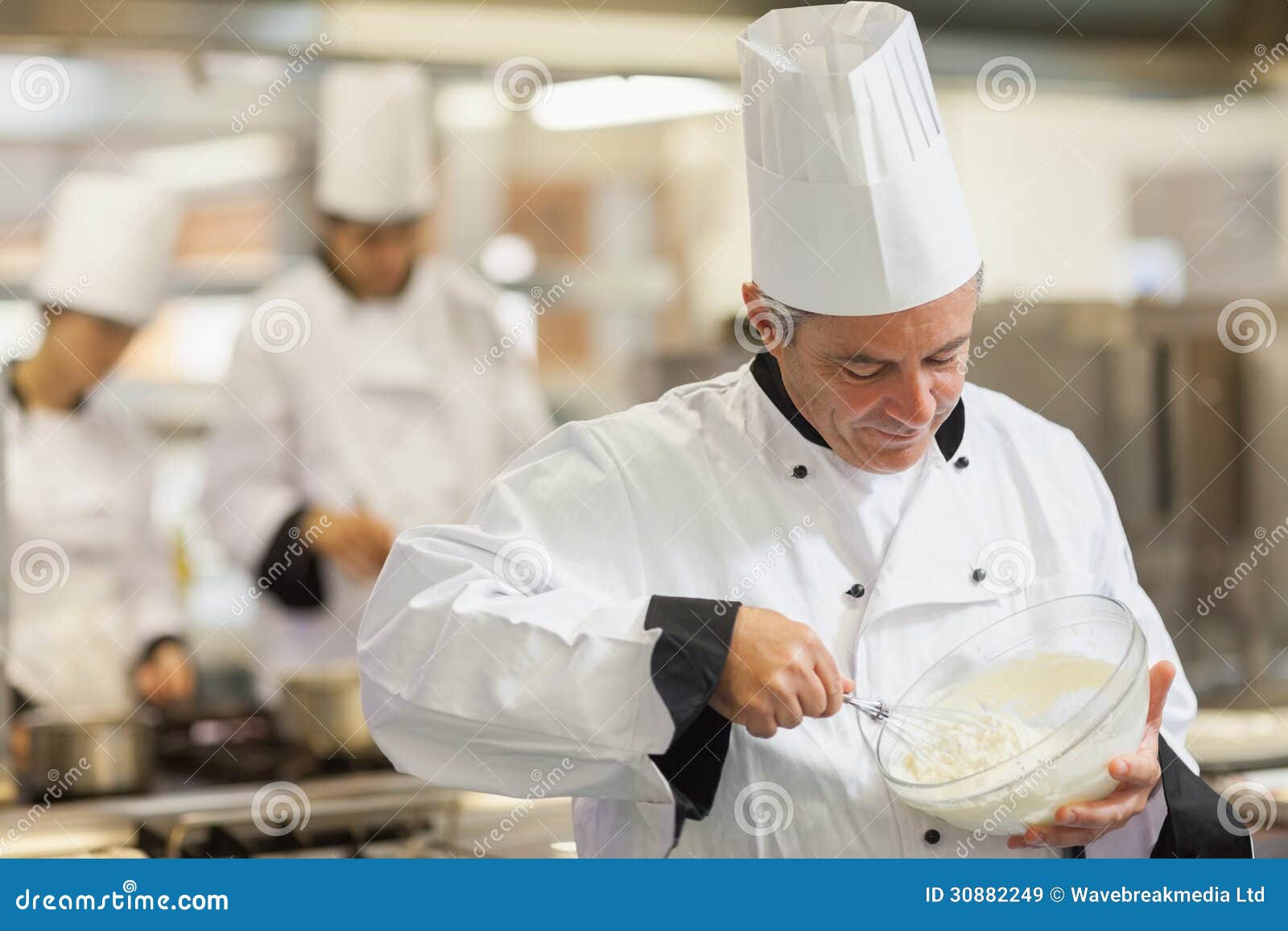 Happy chef whisking cream stock image. Image of chefs - 30882249