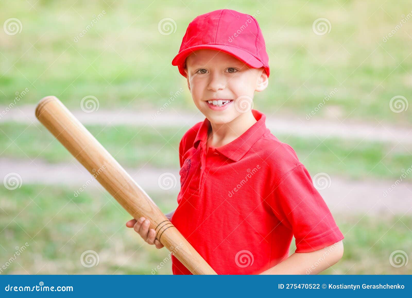 A Happy Child with Baseball Bat on Nature Concept in Park Stock Photo ...