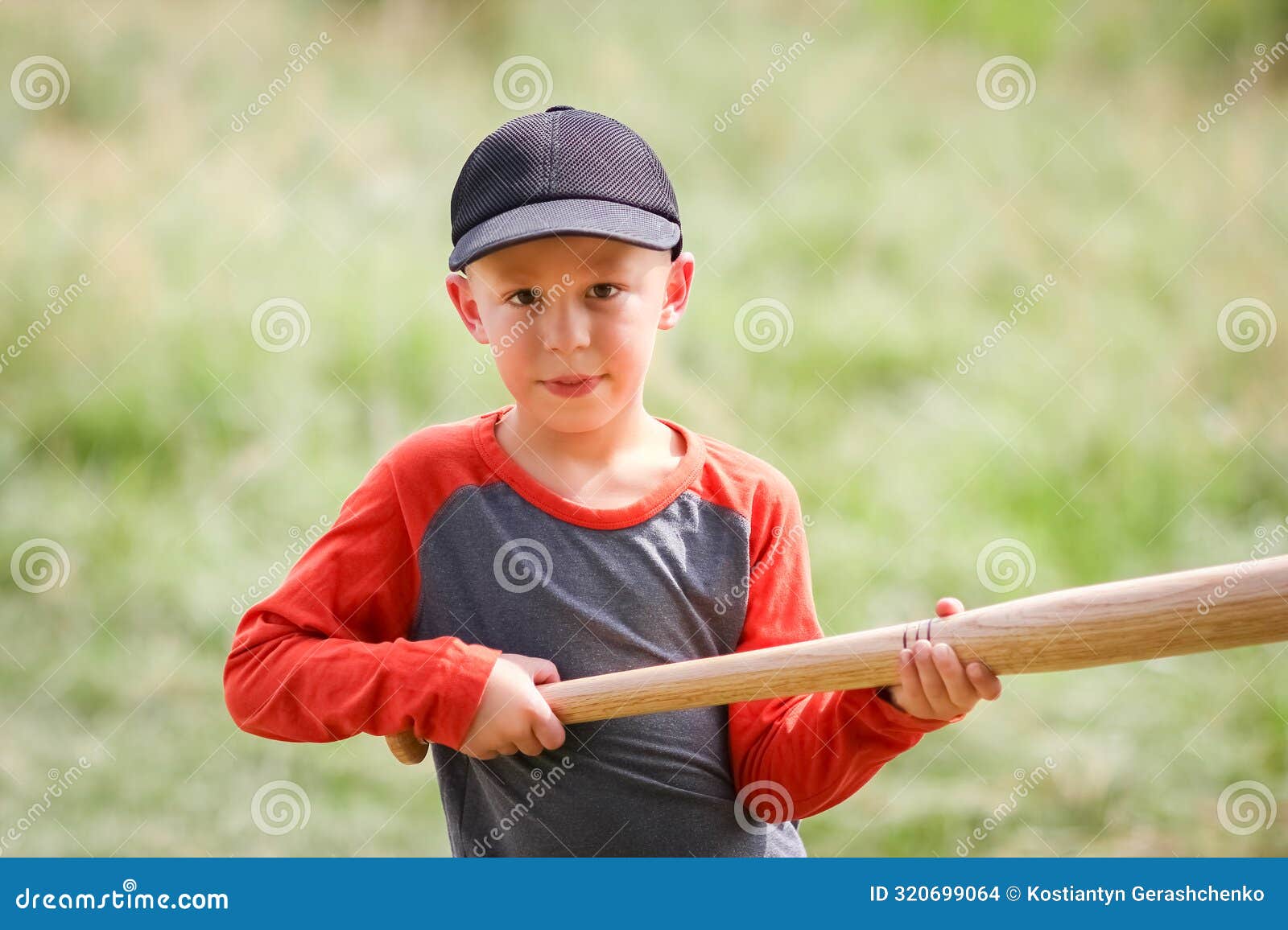 A Happy Child with Baseball Bat on Nature Concept in Park Stock Photo ...