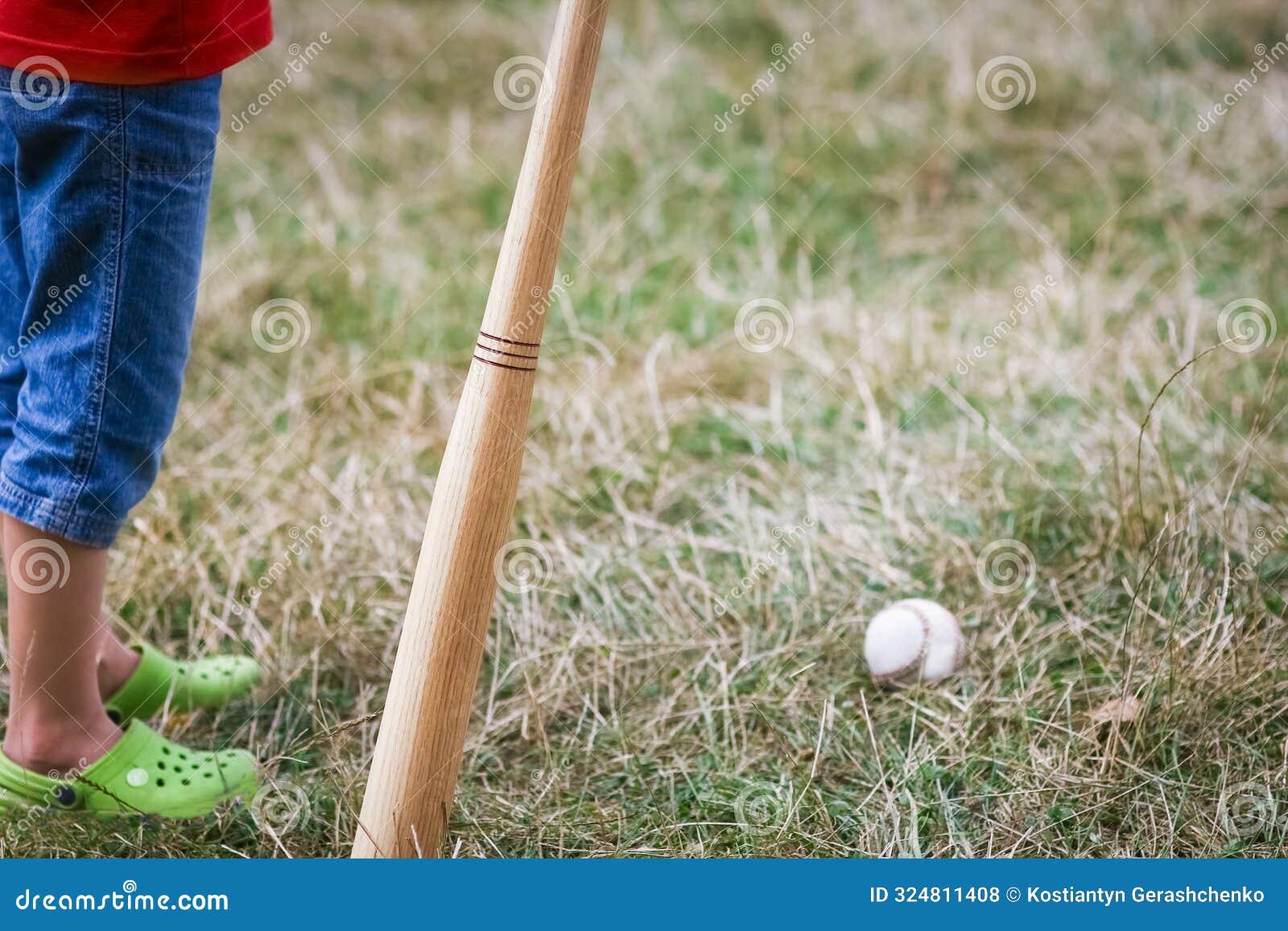 A Happy Child with Baseball Bat on Nature Concept in Park Stock Photo ...