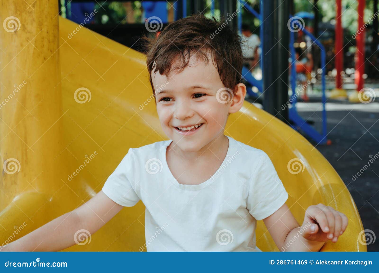 Happy Child Boy Rides a Slide on Playground in Summer Stock Image ...