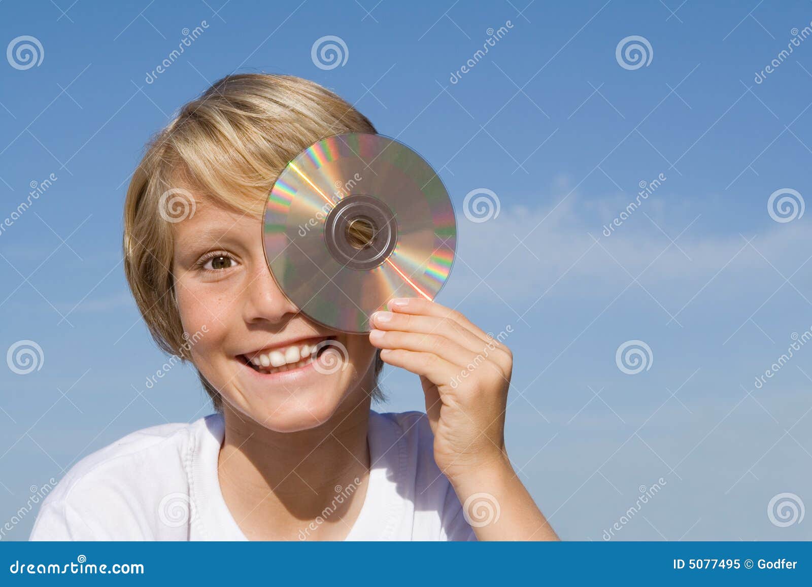 Happy child with cd or dvd stock image. Image of audio - 5077495