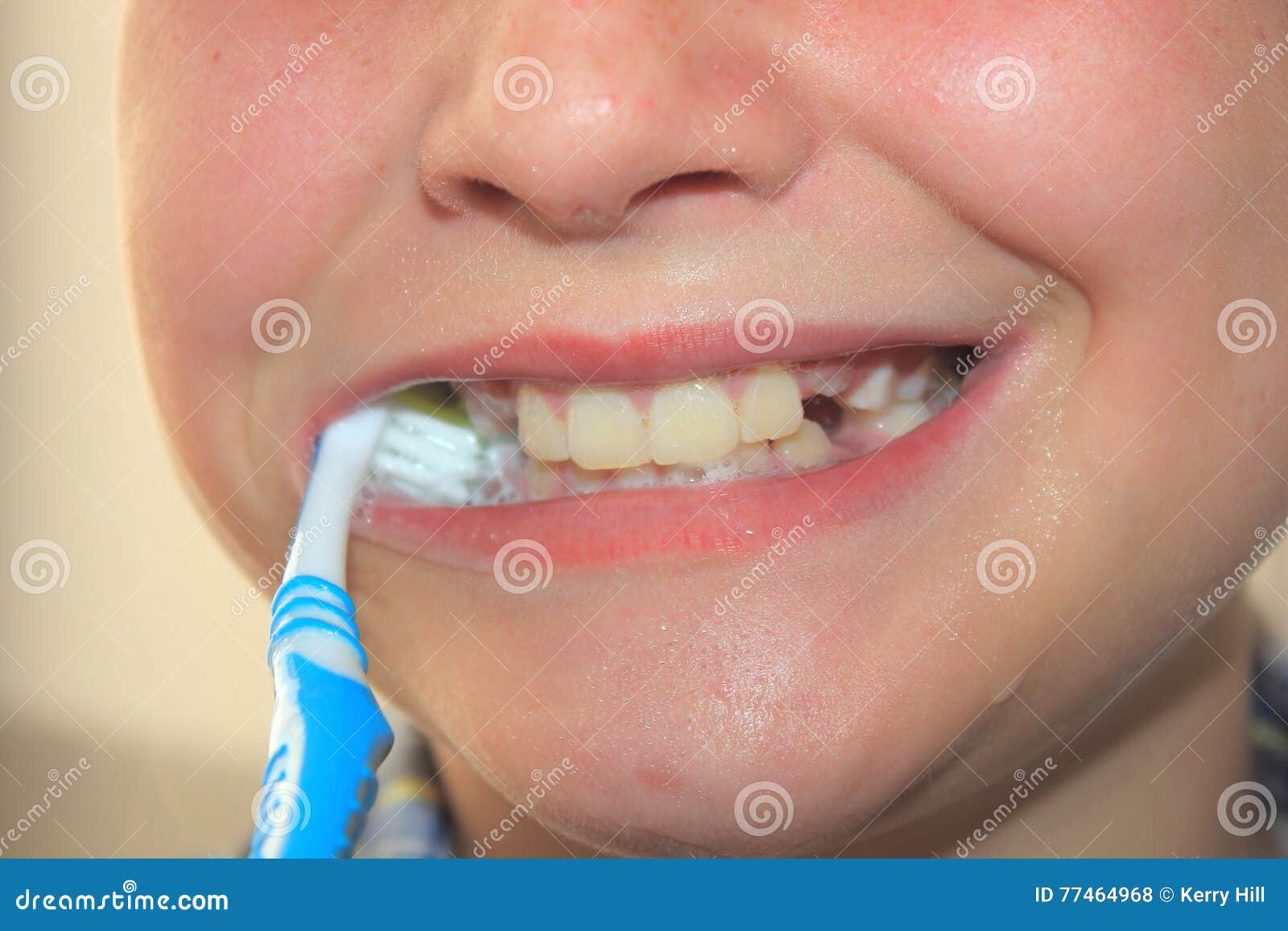 Happy child cleaning teeth stock photo. Image of happy - 77464968
