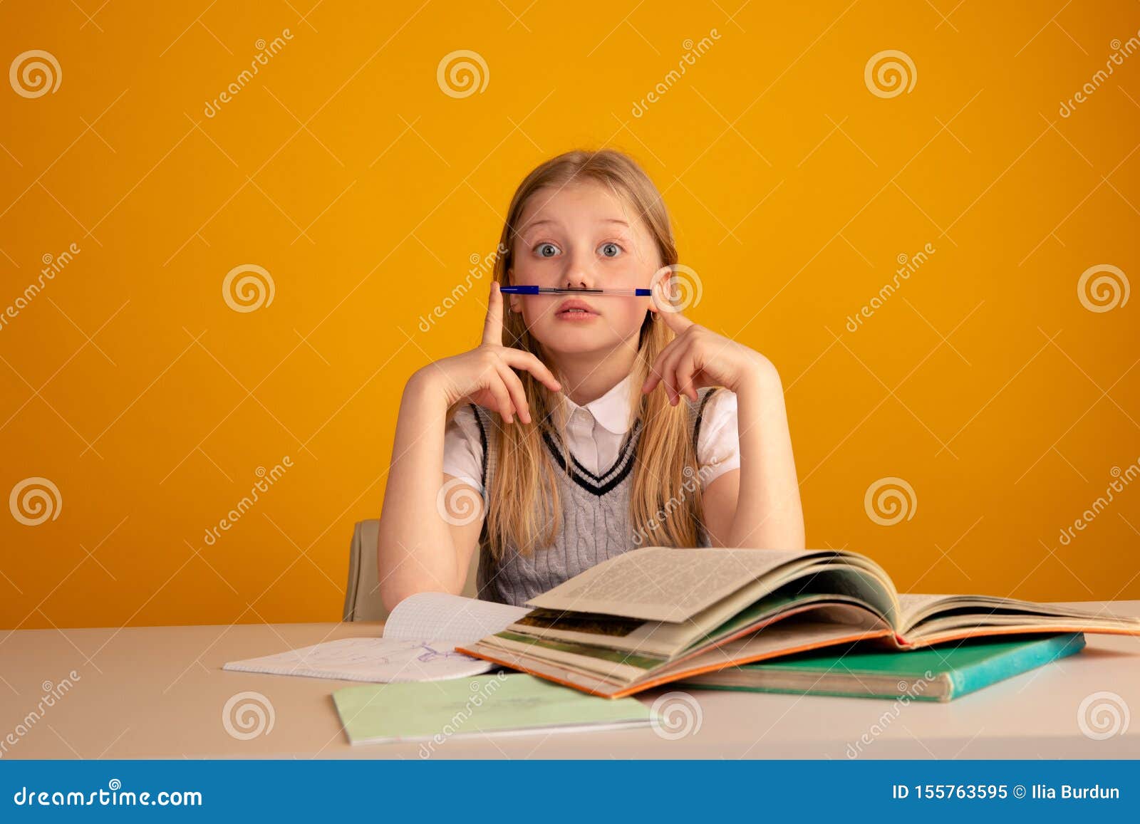 Happy Child Doing Homework Sitting Isolated the Bright Yellow ...