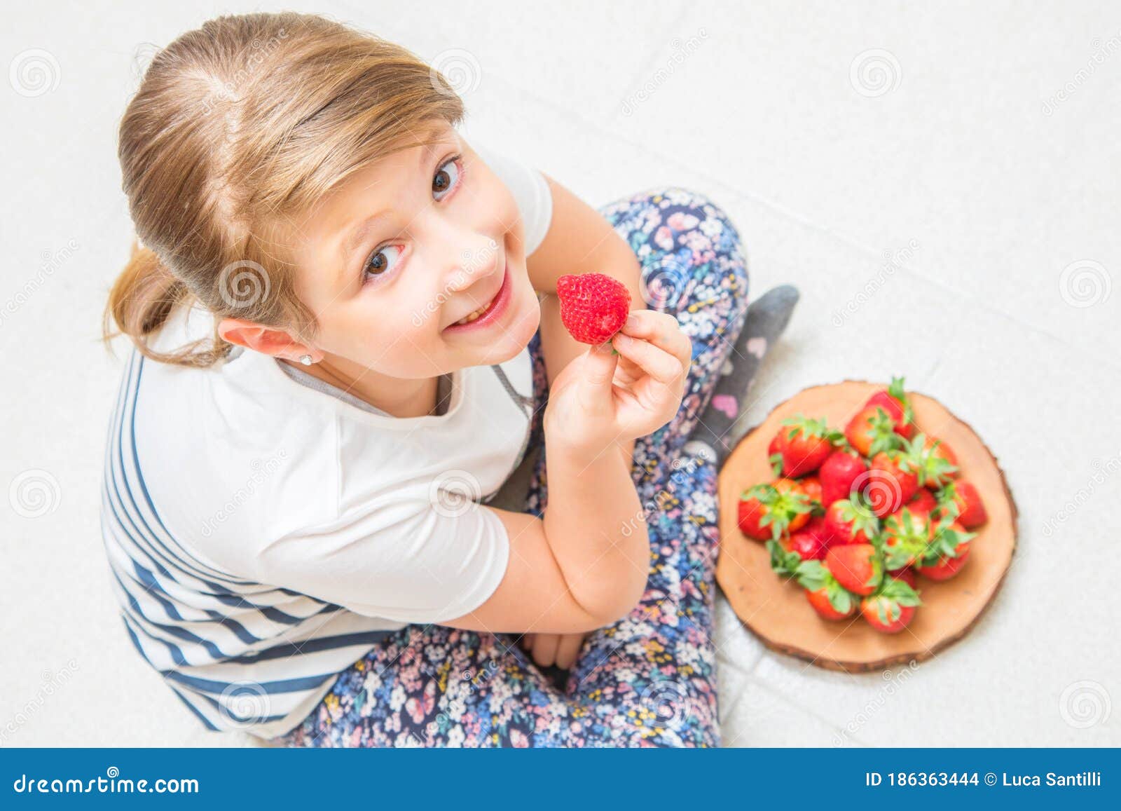 Happy Child is Eating Fresh Strawberry Stock Photo - Image of little ...
