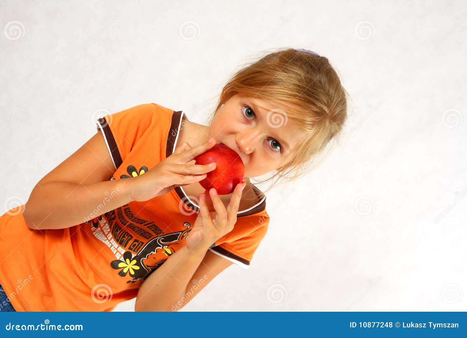 Happy Child with a fruit stock photo. Image of studio - 10877248