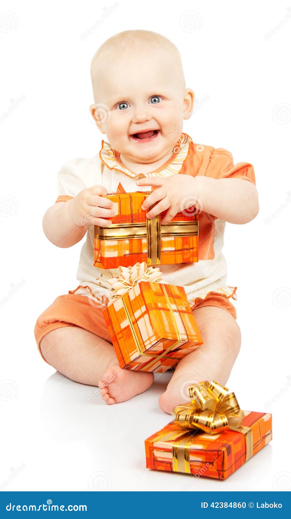 Happy child holding a gift stock photo. Image of holiday - 42384860
