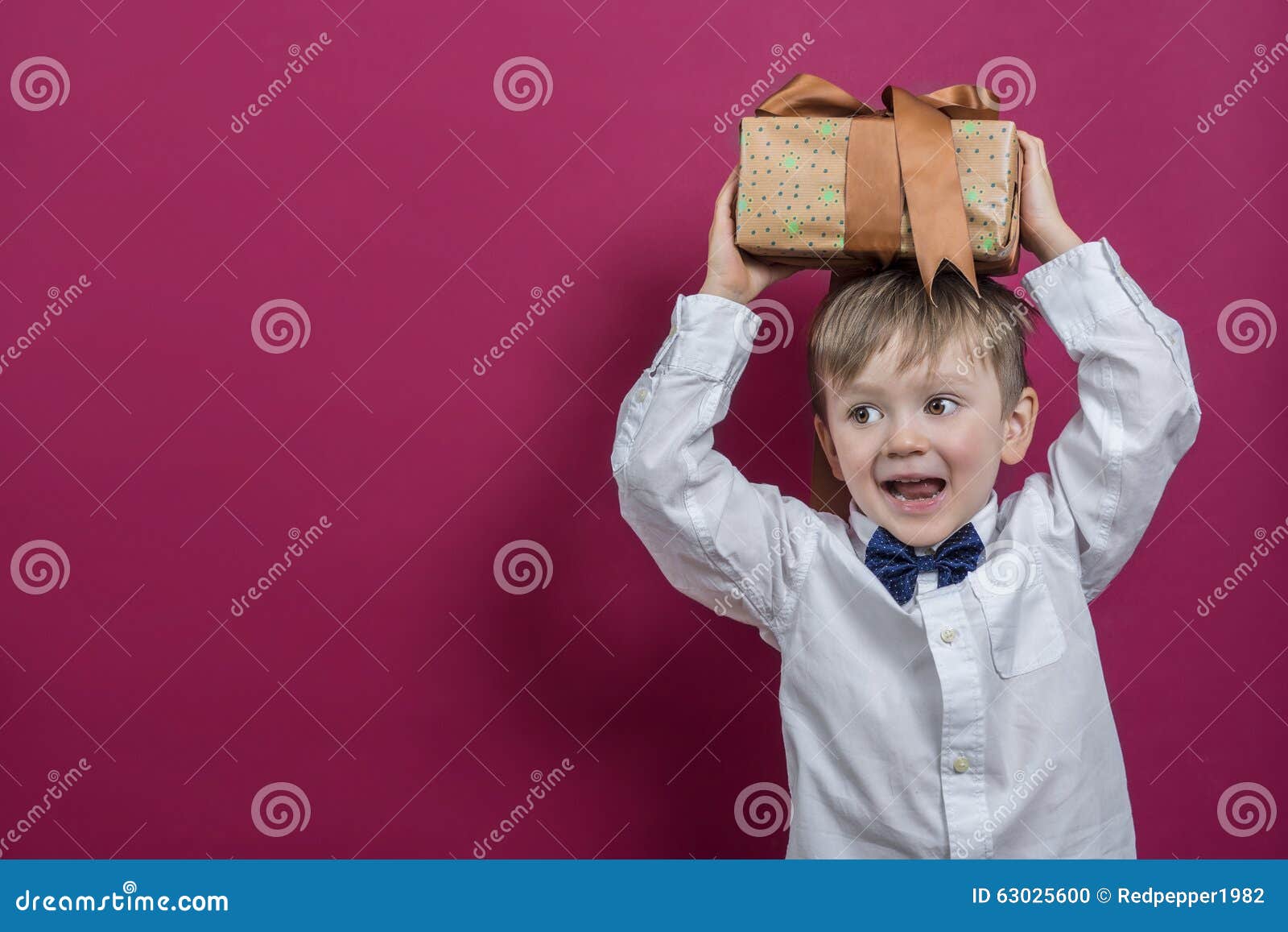 Happy Child Holding a Present Stock Photo - Image of small, child: 63025600