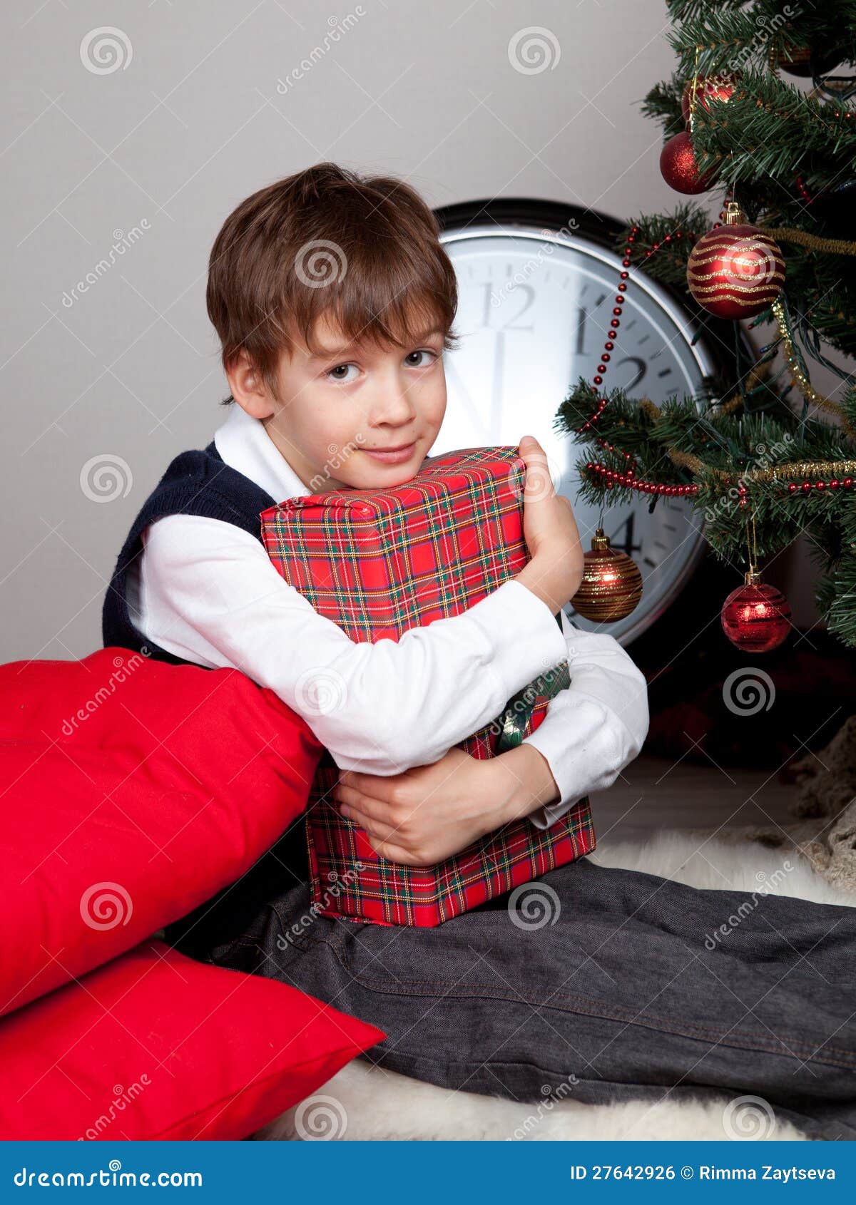 Happy Child Hugs Christmas Gift Stock Photo - Image of indoor, embrace ...