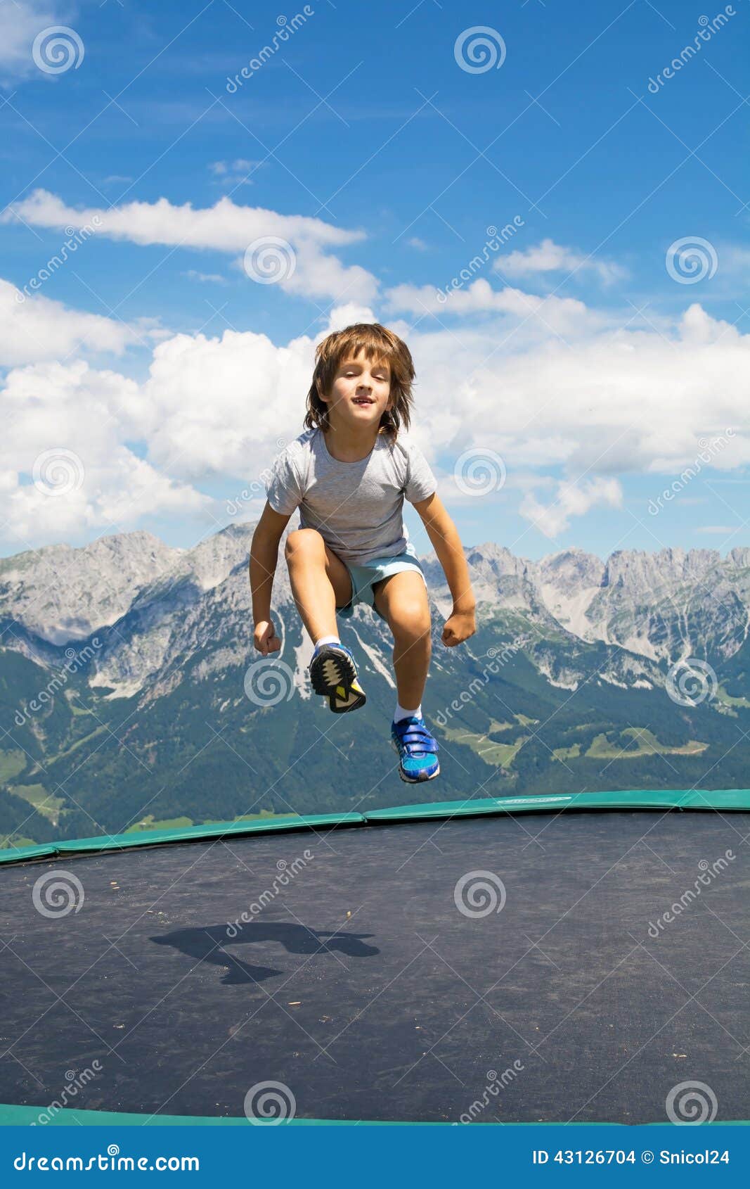 Happy child jumping stock photo. Image of play, trampolin - 43126704