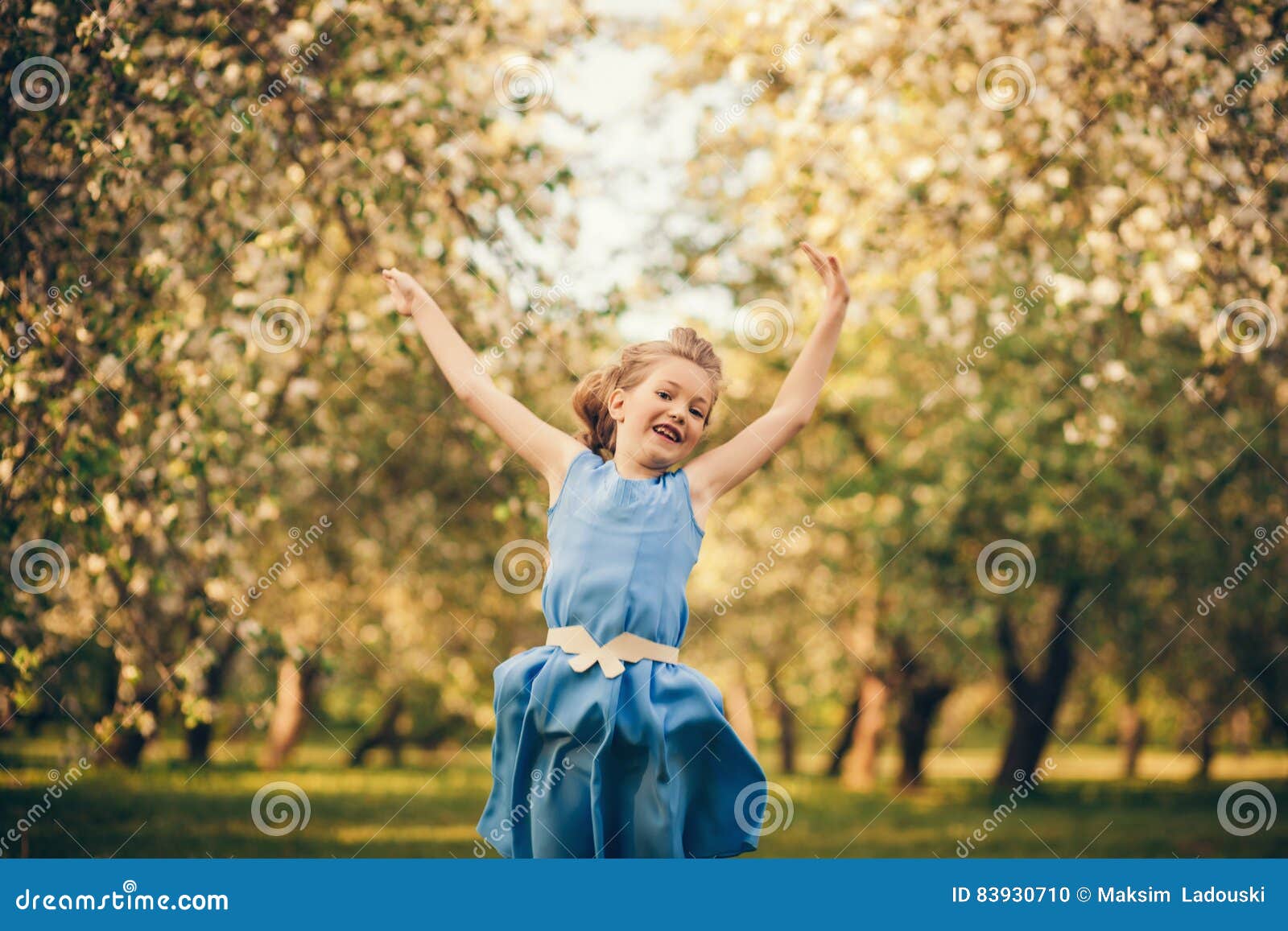 Happy child jumping stock photo. Image of casual, family - 83930710