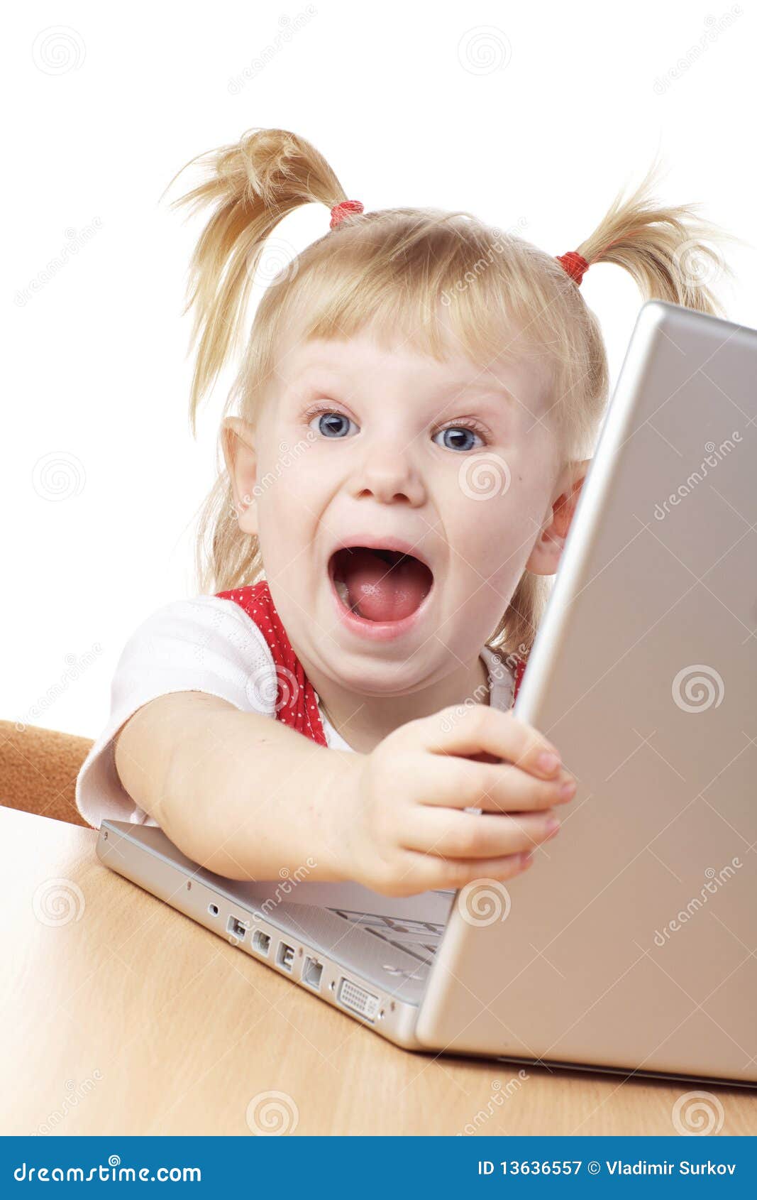 Happy child and laptop stock image. Image of modern, office - 13636557