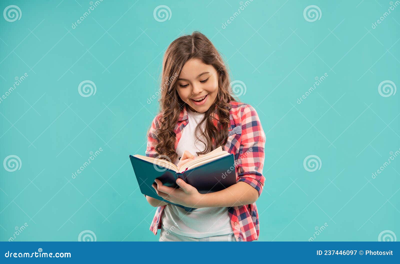 Happy Child Making Notes on Blue Background, Childhood Stock Image ...