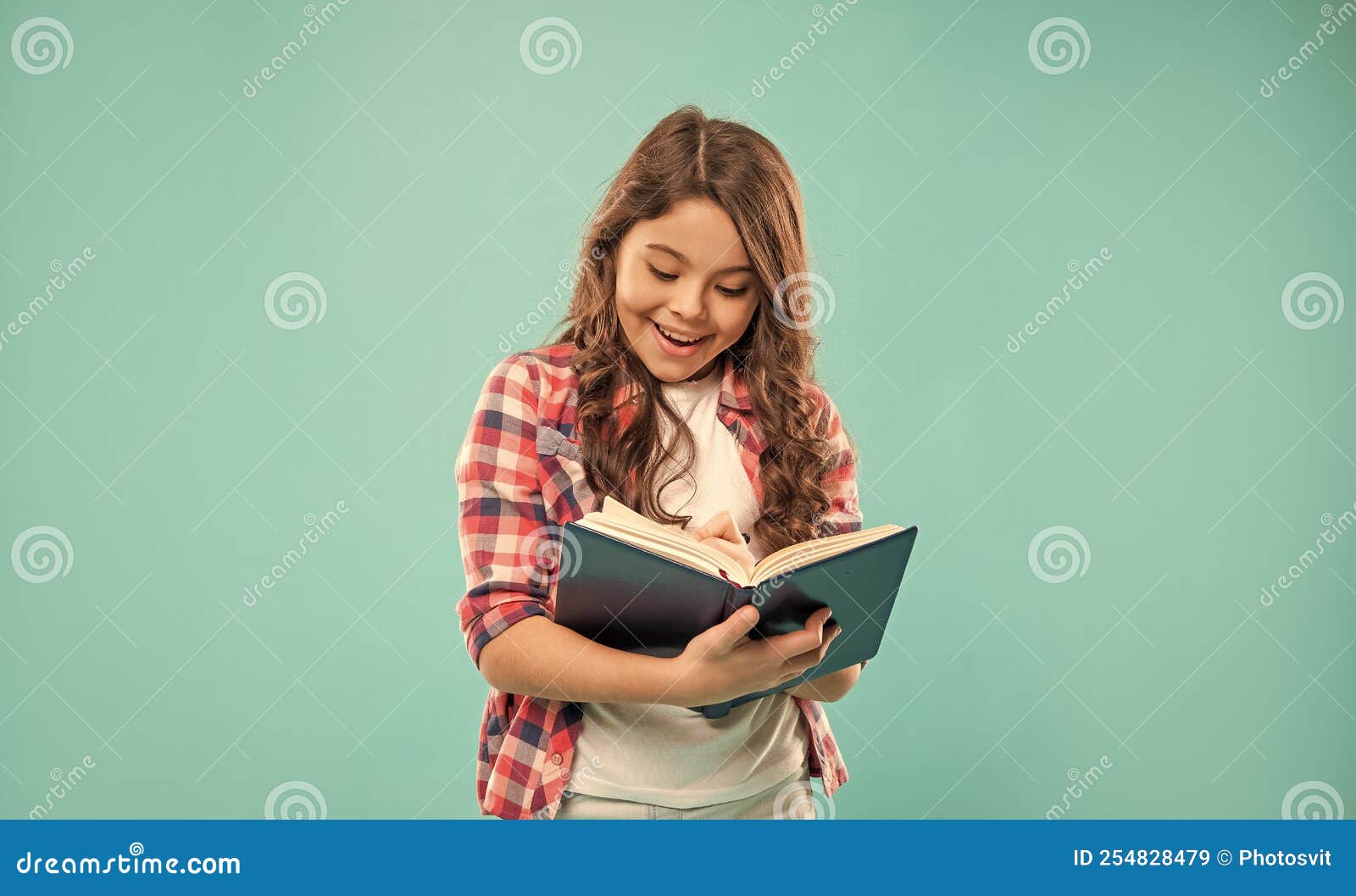 Happy Child Making Notes on Blue Background, Childhood Stock Image ...