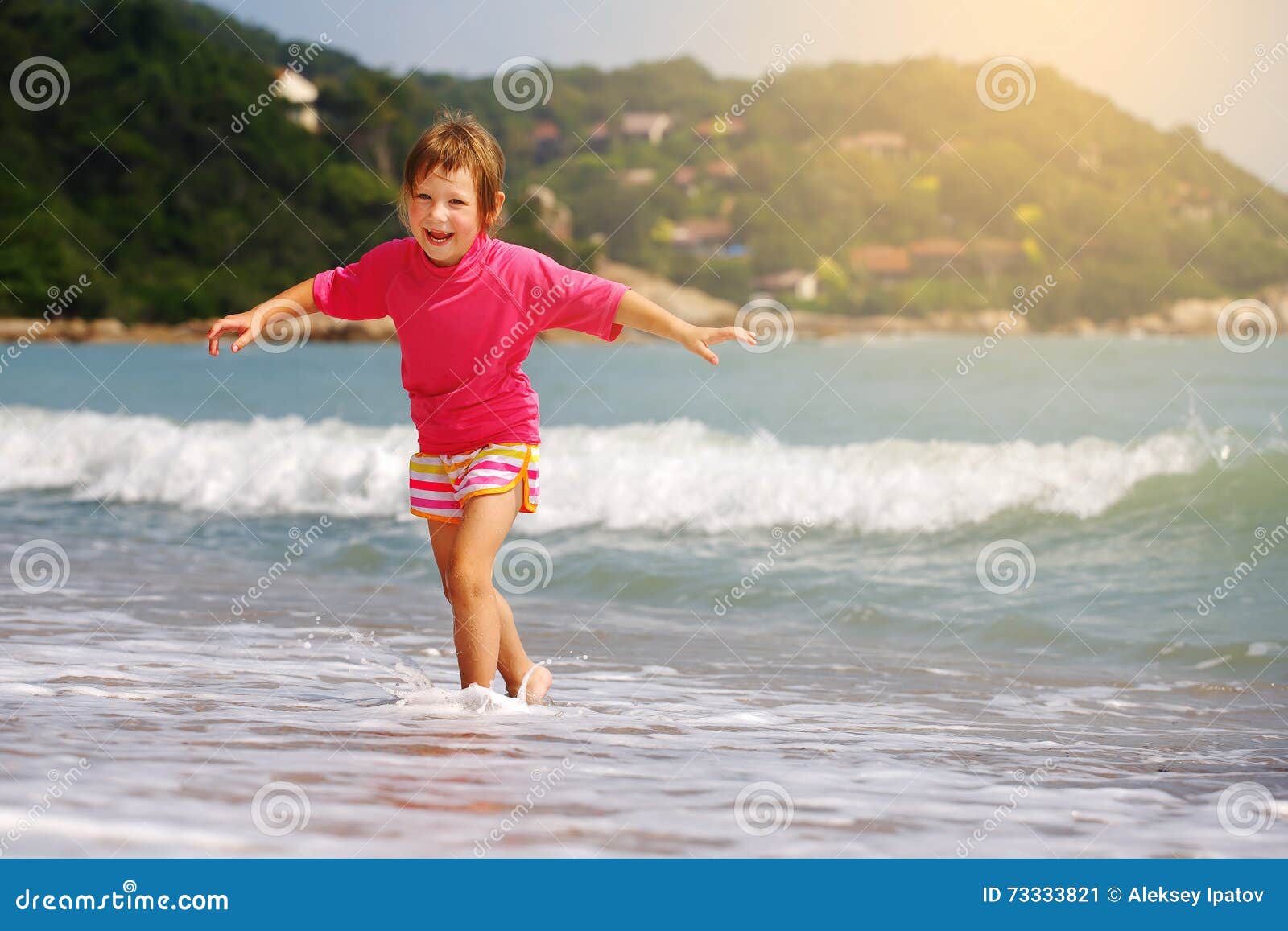 Happy Child Playing in Sea. Stock Image - Image of smiling, holiday ...